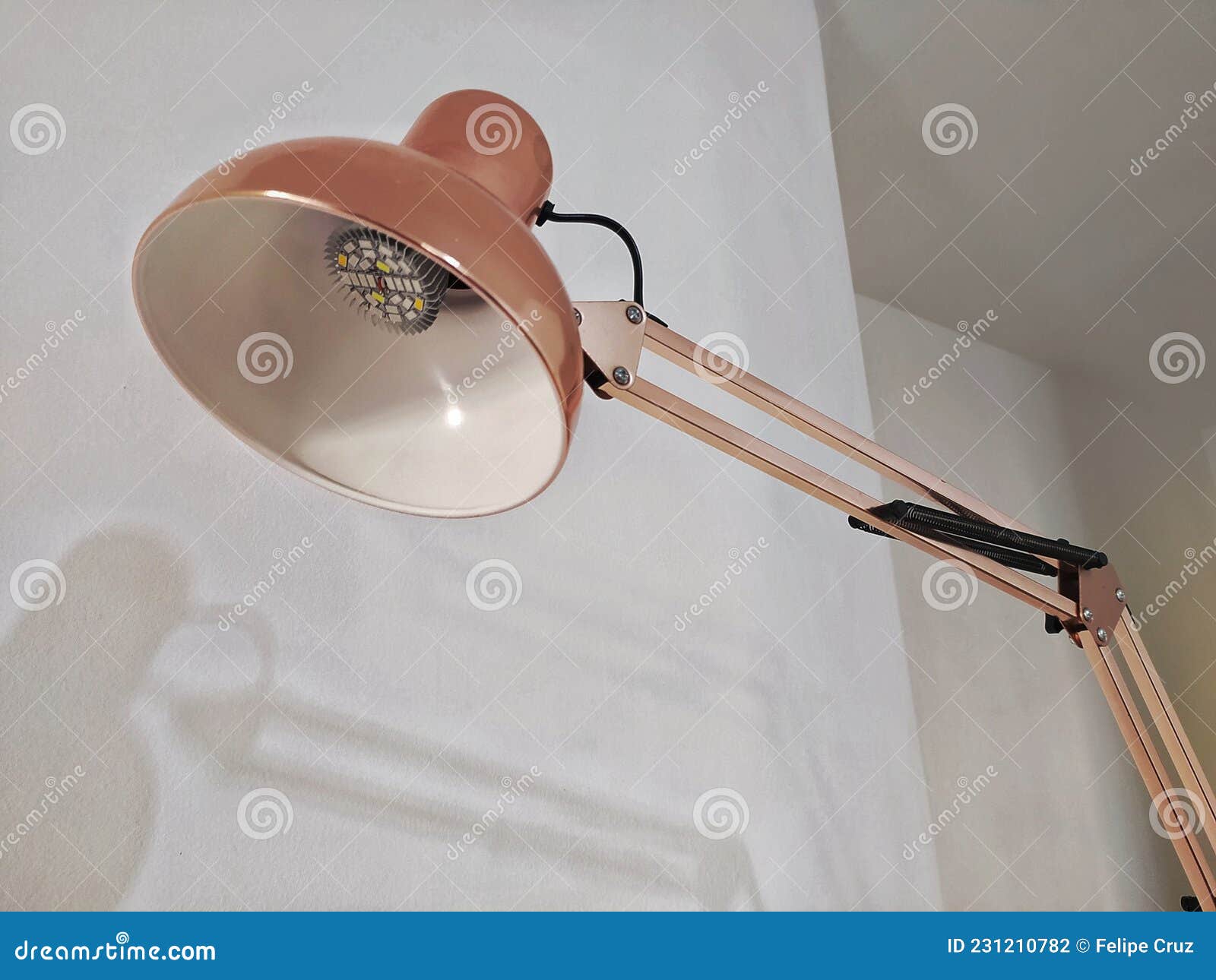 Pink Lamp Turned Off Shot Against a White Wall Stock Photo - Image of ...