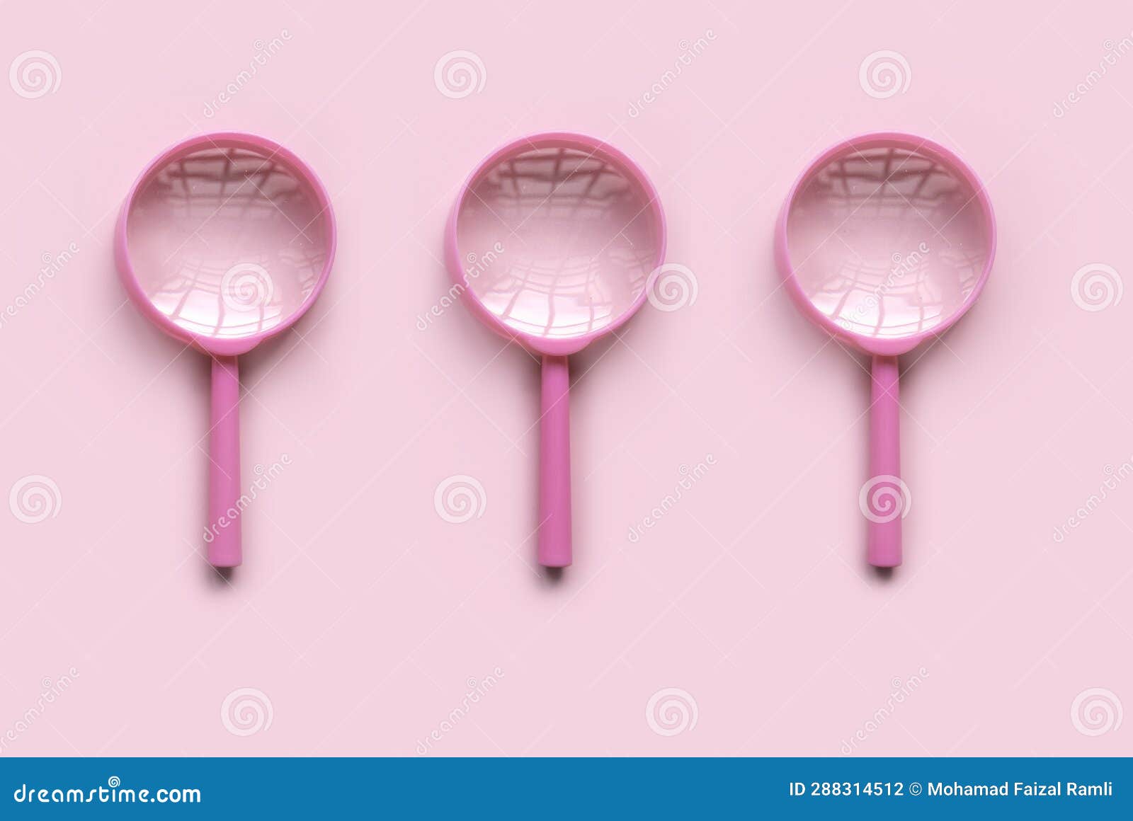 Pink Magnifying Glass Over a Pink Background Stock Photo - Image of ...
