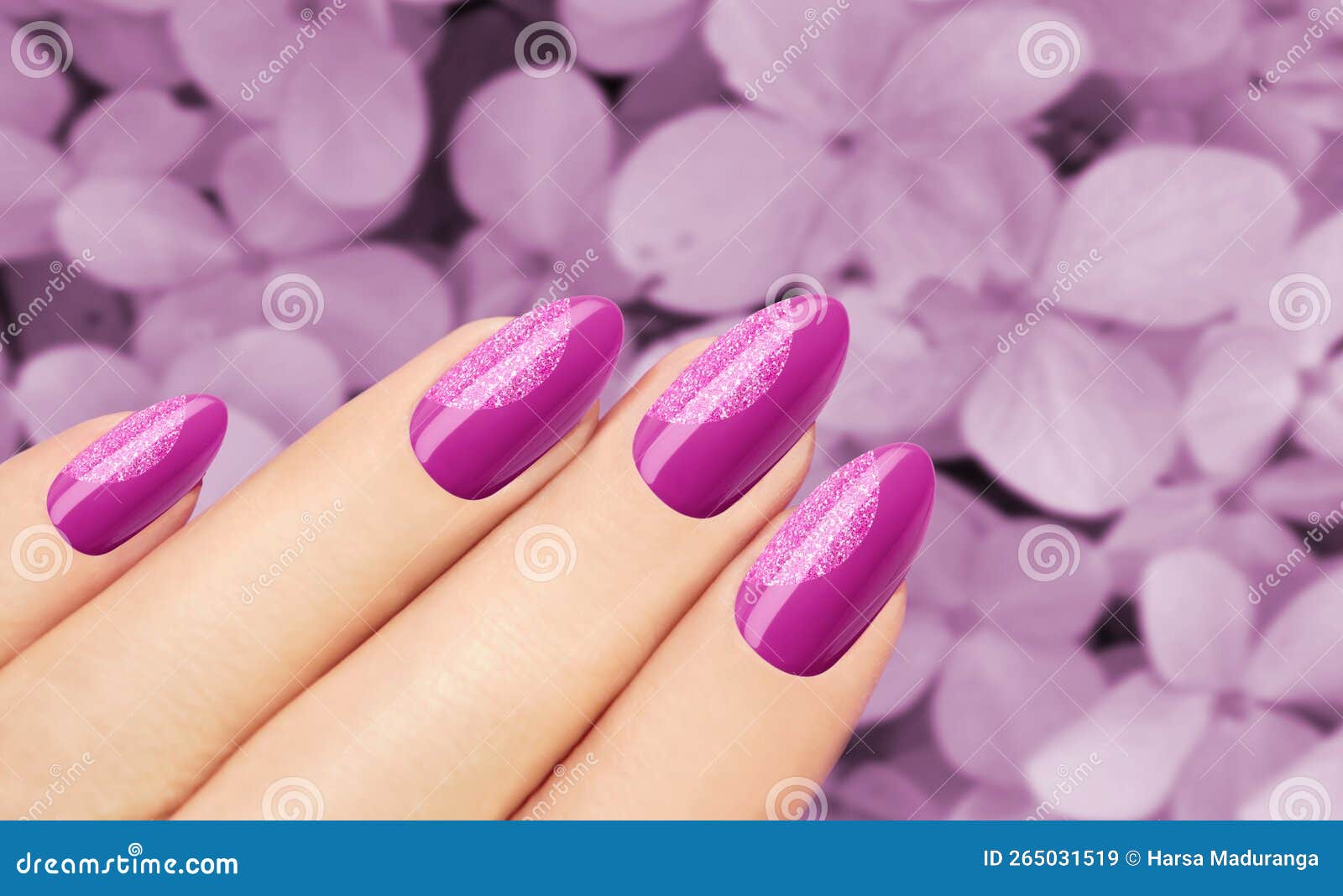 Pink Manicure with Pink and Glitter on a Background of Flowers Stock ...
