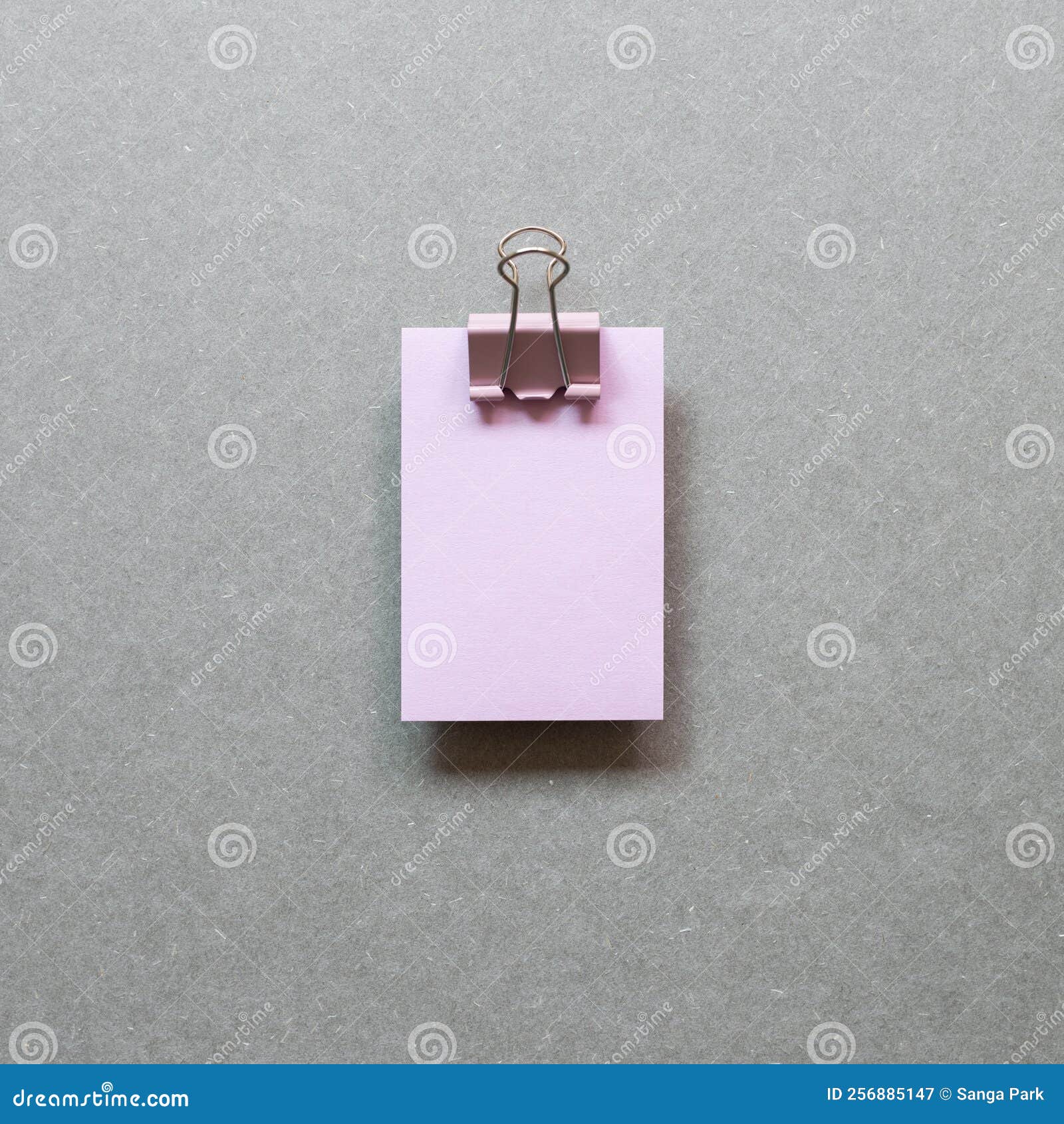 Pink Memo Paper, Sticky Notes with Binder Clip on Gray Background. Top ...