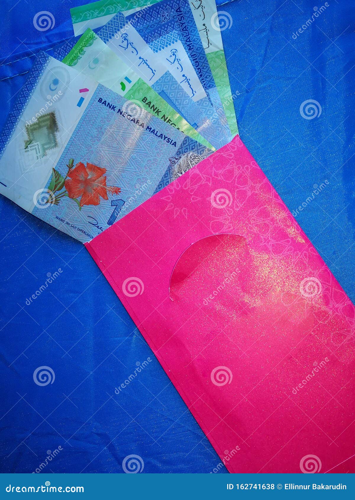 Pink Packet or Known As Duit Raya Isolated on Blue Background Stock ...