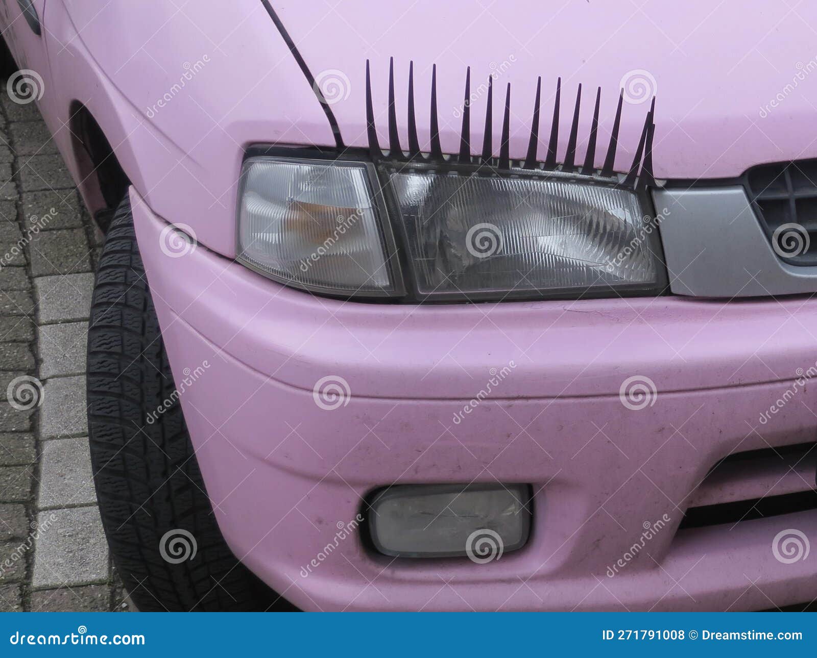 Pink Painted Car with Lashes on Its Headlight Stock Photo - Image of ...