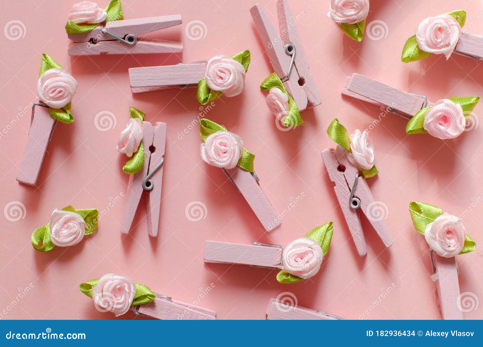 Pink Pegs on Pink Background. Decorative Pegs Pattern Stock Photo ...