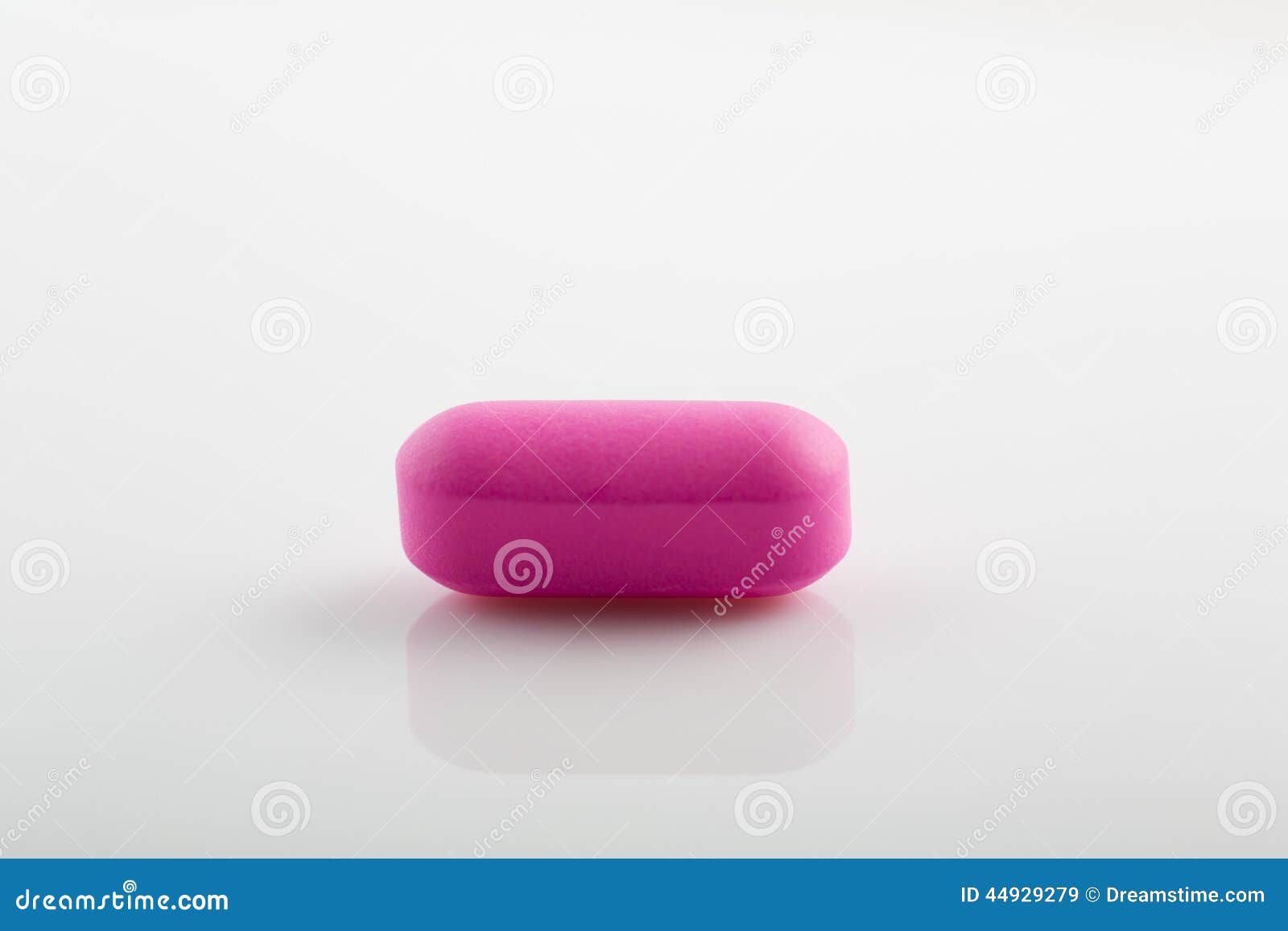 Pink pill on white stock image. Image of headache, medical - 44929279