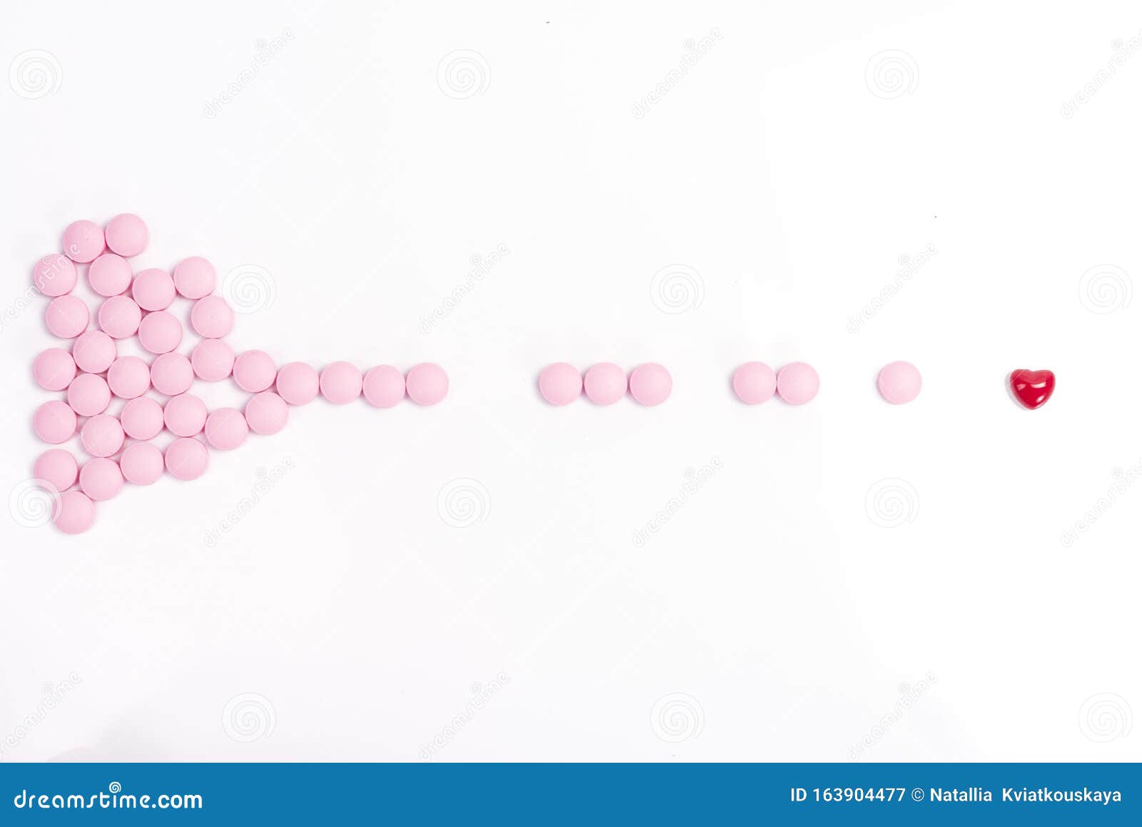 Pink Pills on a White Background with a Red Heart. Heart Pills Stock ...