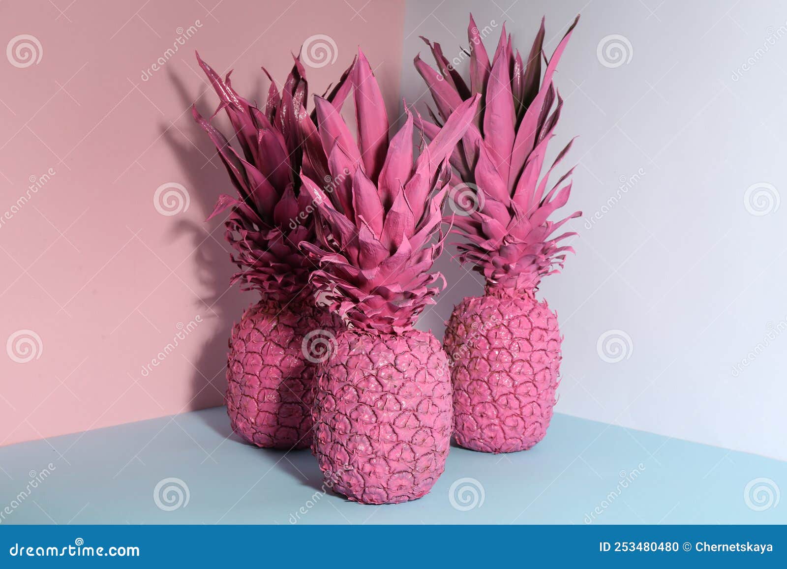 Pink Pineapples on Color Background. Creative Concept Stock Photo ...
