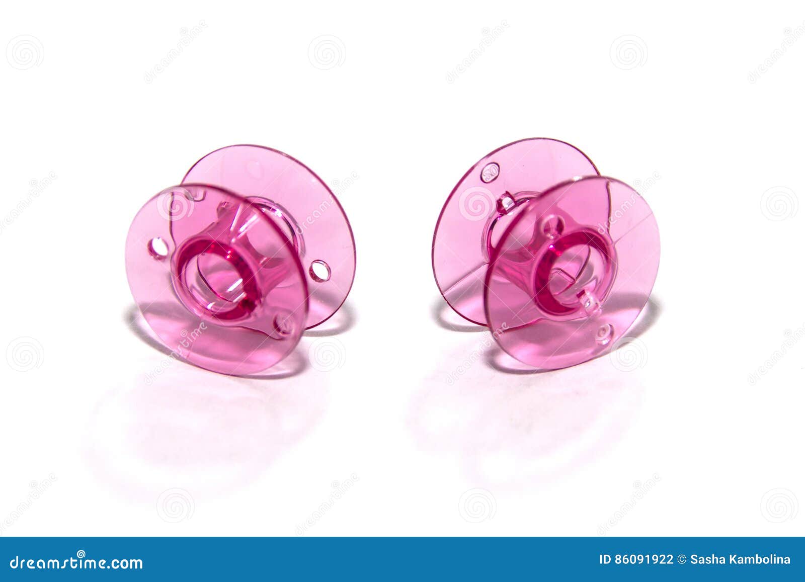 Pink Plastic Bobbin for Sewing Machine Stock Photo - Image of ...