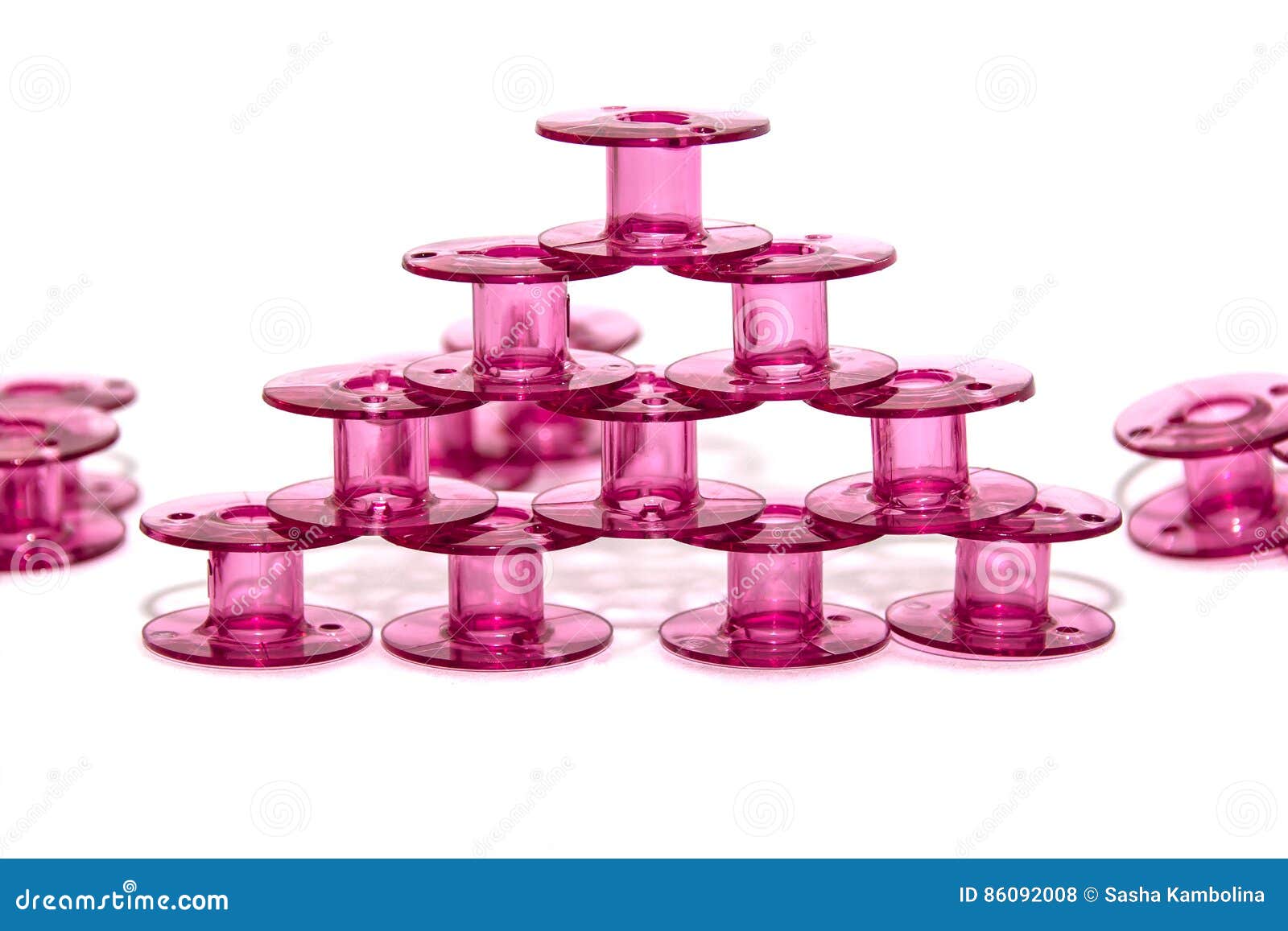 Pink Plastic Bobbin for Sewing Machine Stock Photo - Image of sewing ...