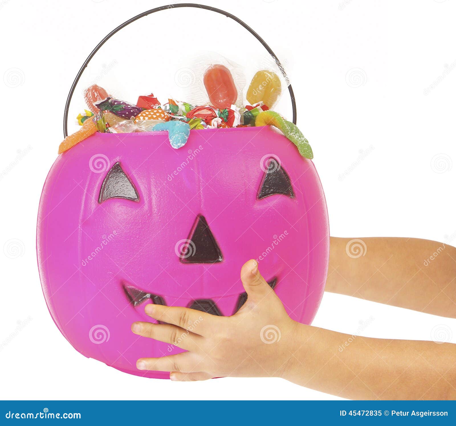 Pink Plastic Pumpkin Filled with Candy, Hand of Kid Stock Image - Image ...