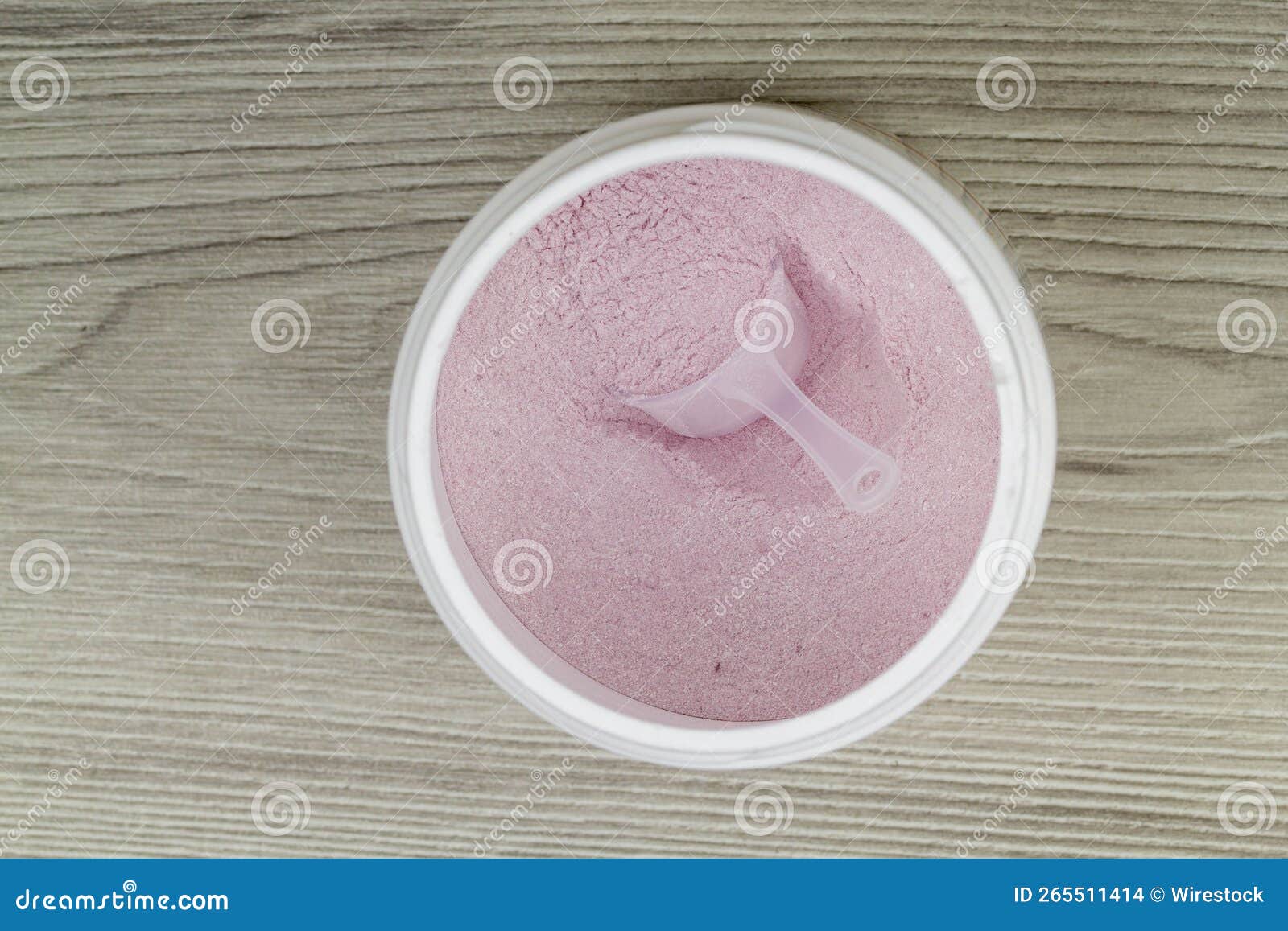 Pink Protein Powder with Spoon in Wooden Background Stock Photo - Image ...