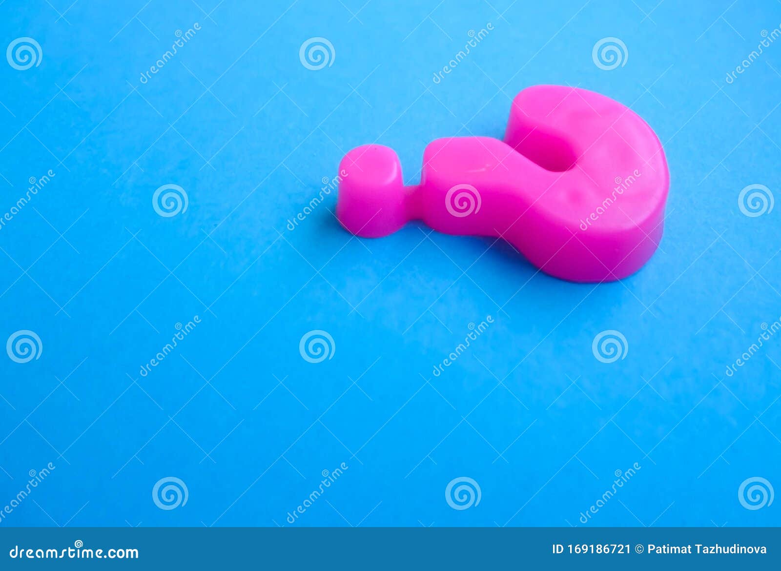 Pink Question Mark Located Sideways On A Blue Background With Copy ...
