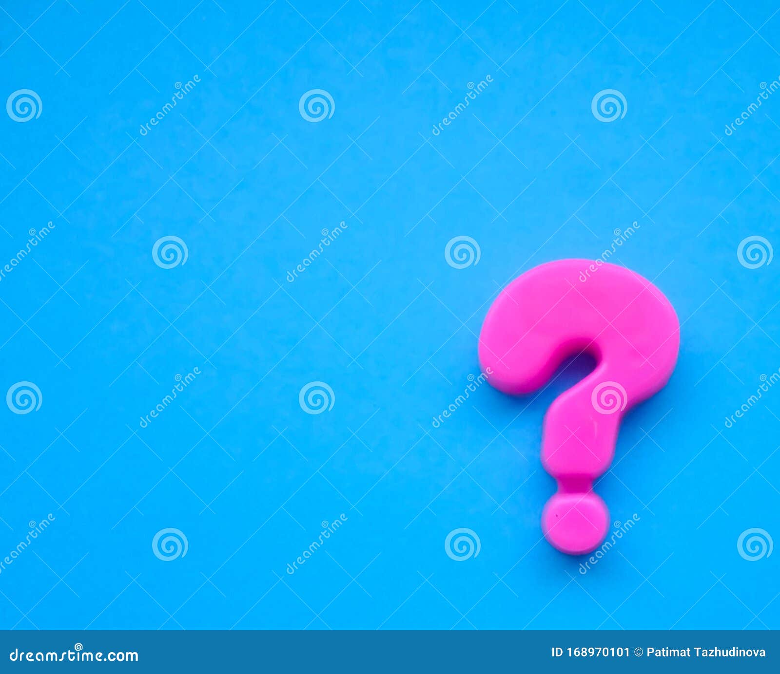 Pink Question Mark Located Sideways On A Blue Background With Copy ...