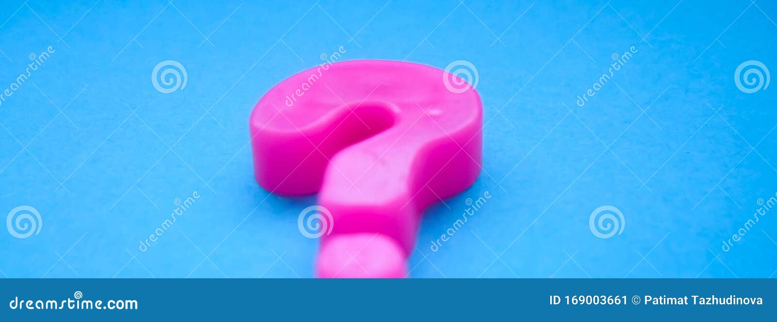 Pink Question Mark Located Sideways on a Blue Background with Copy ...