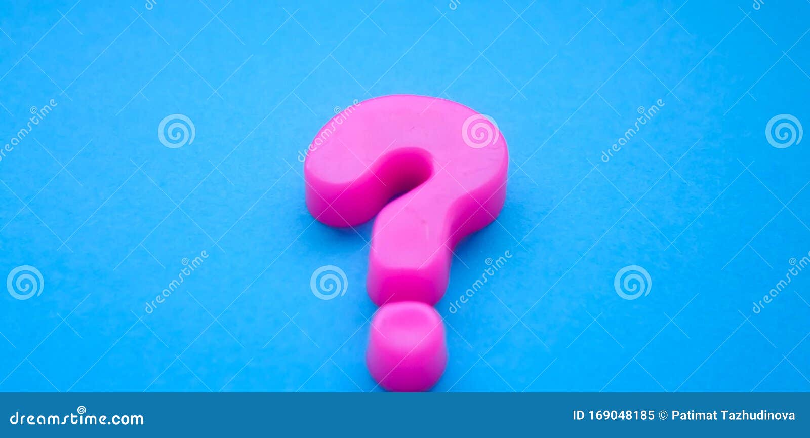 Pink Question Mark Located Sideways On A Blue Background With Copy ...