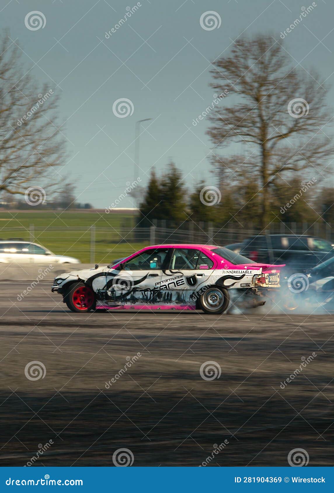 Pink Race Car Speeding Around a Racetrack Editorial Stock Image - Image ...