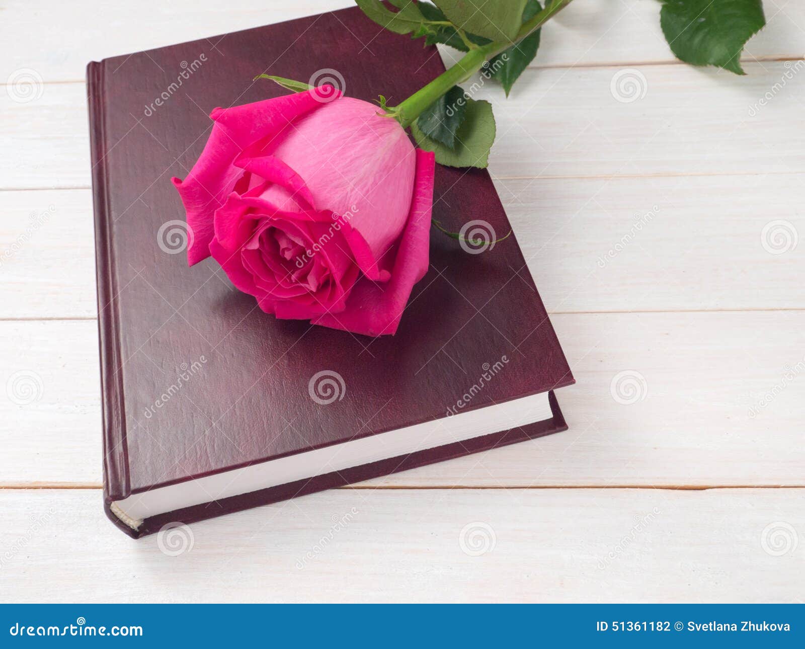 Red Rose And Book On A Wood Background Royalty-Free Stock Photography ...