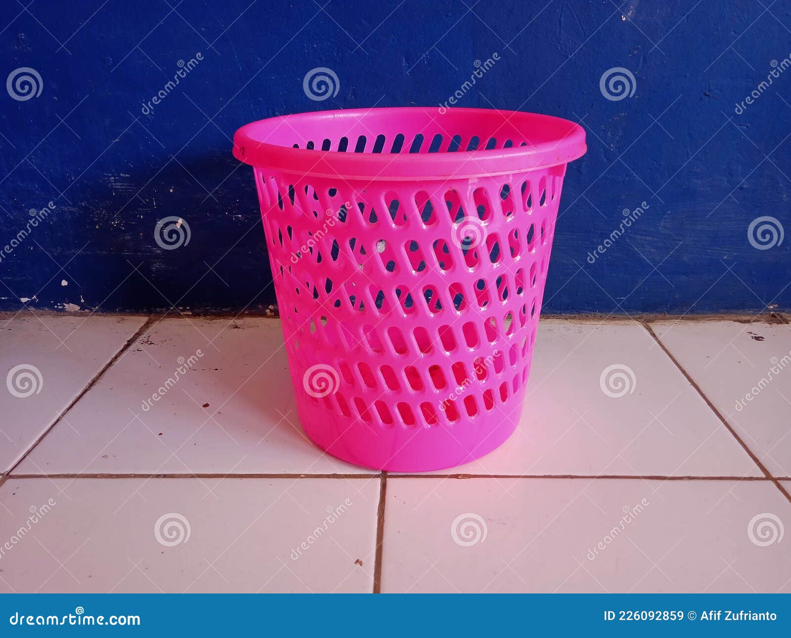 Pink Rubbish Bin on the Floor Stock Image - Image of violet, petal ...