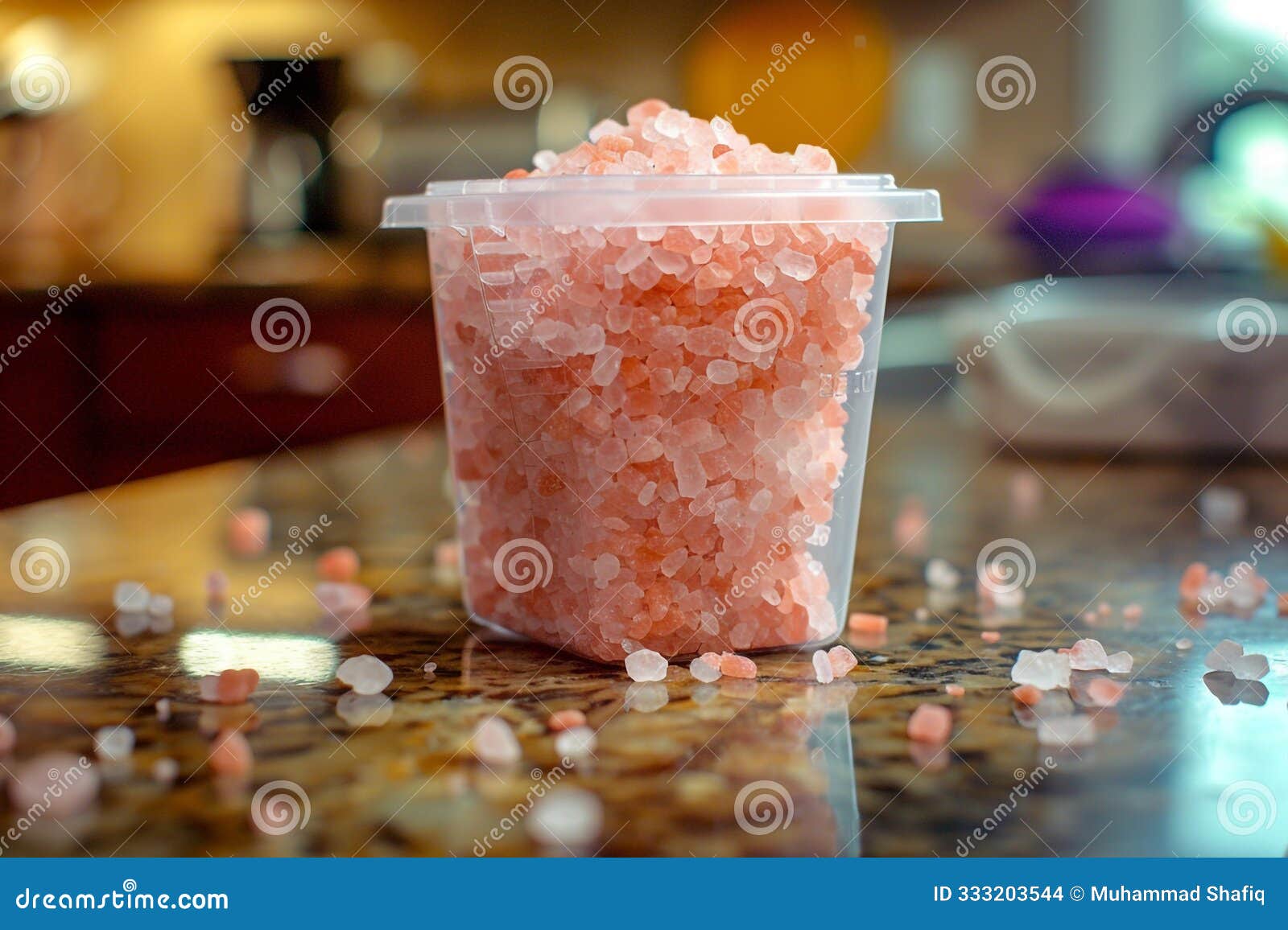 Pink Salt in a Transparent Plastic Container with a Lid, Placed on a ...