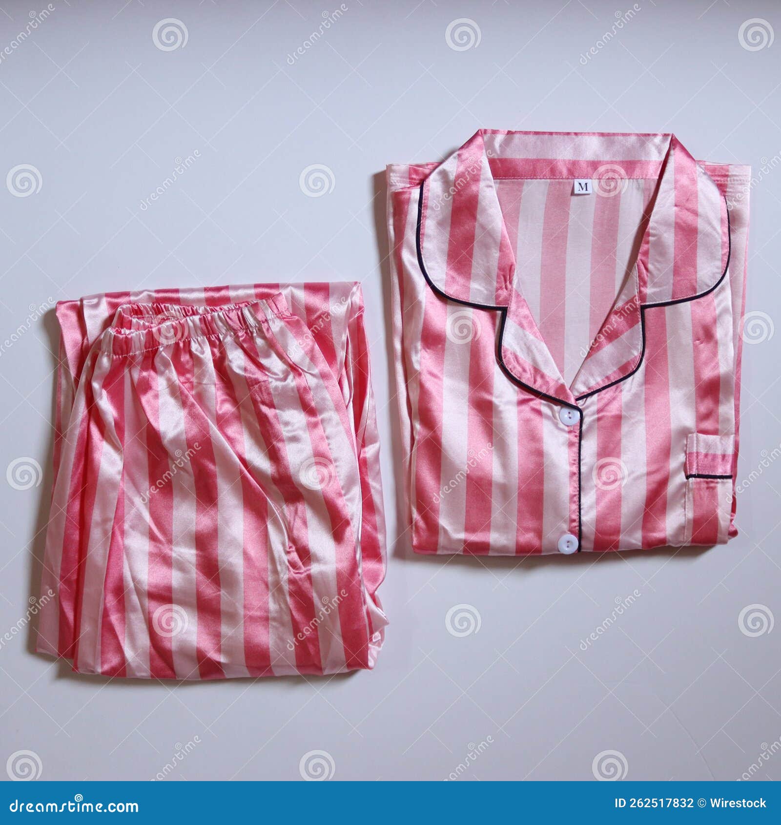 Pink satin pajamas set stock photo. Image of cozy, silk - 262517832