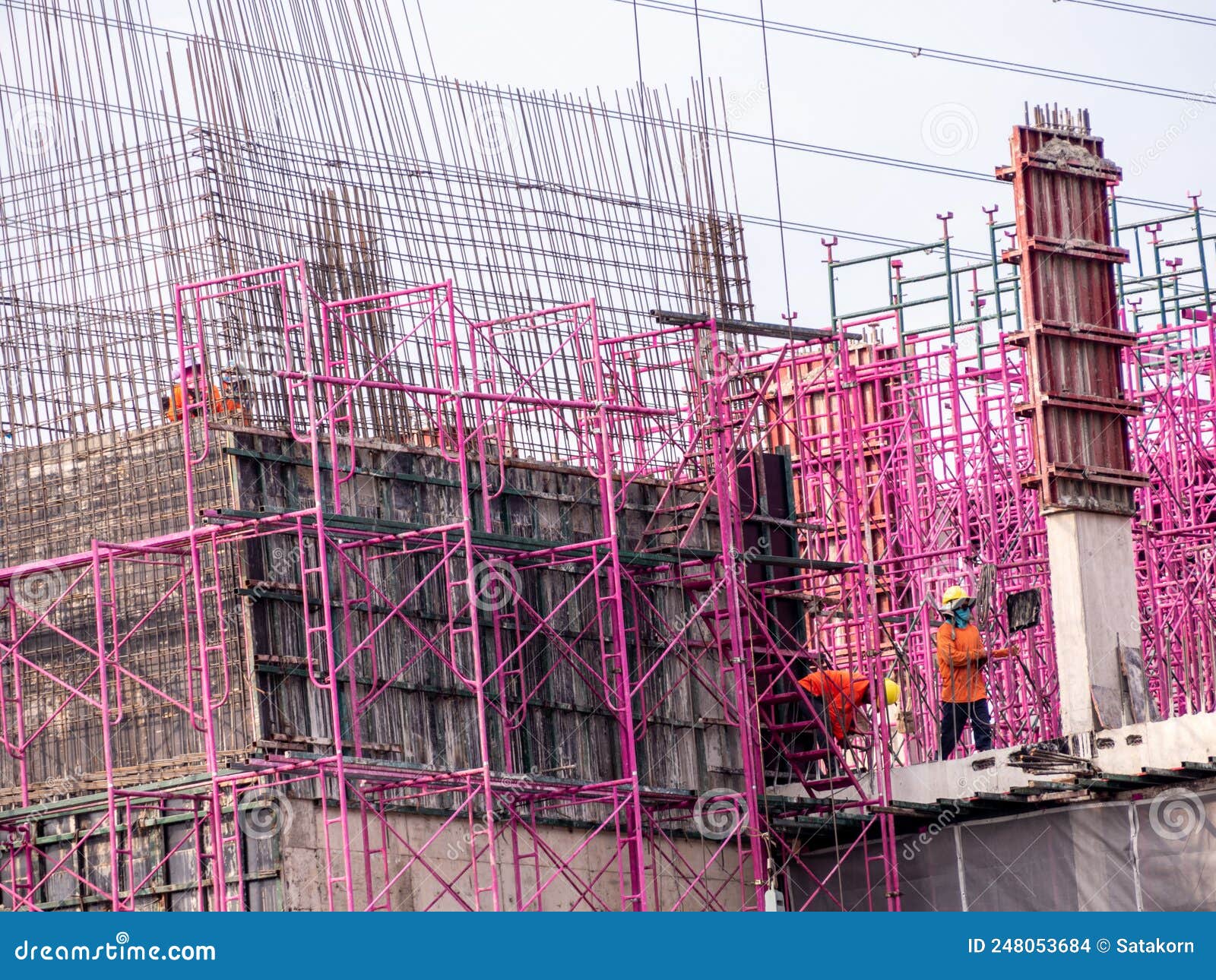 The Pink Scaffolding on the Building Under Construction Stock Photo ...