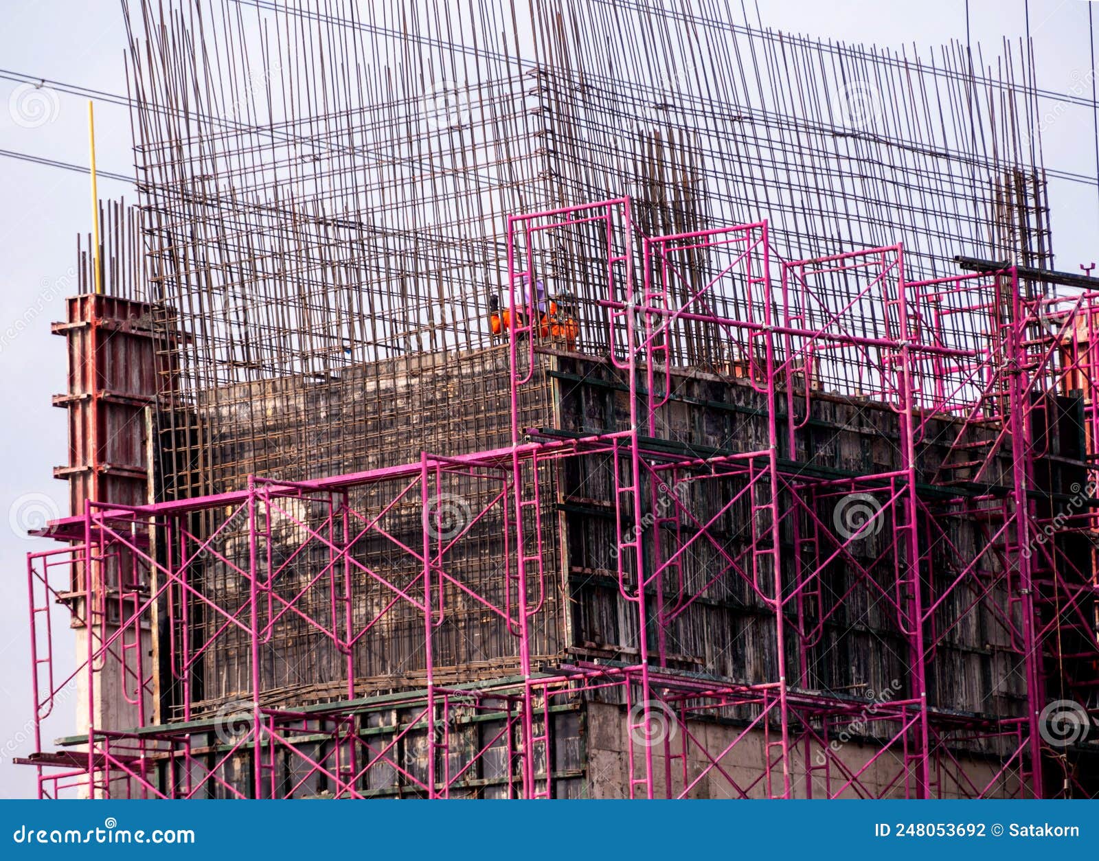 The Pink Scaffolding on the Building Under Construction Stock Photo ...