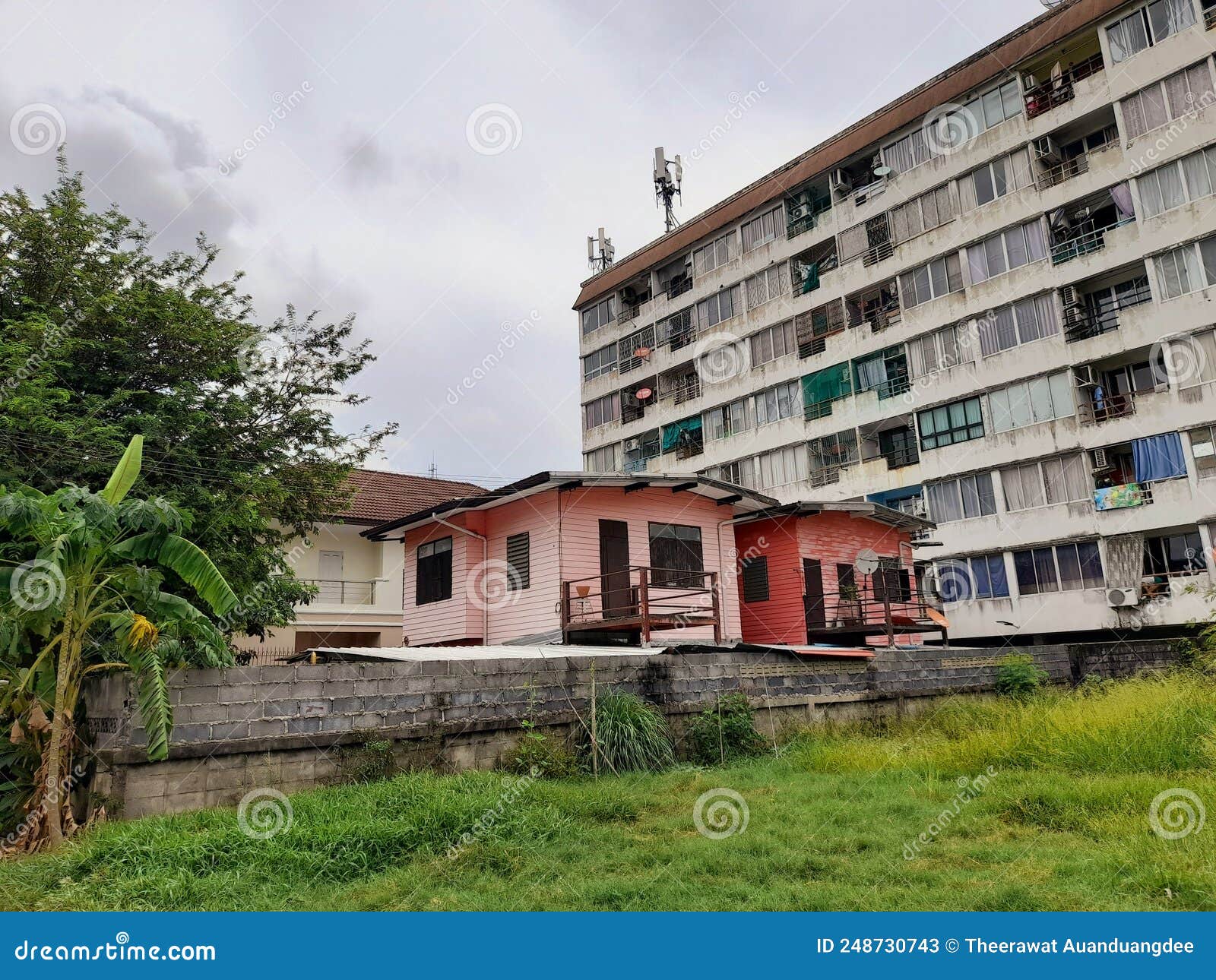 Pink Semi-detached House and Multi-storey Building Editorial Stock ...