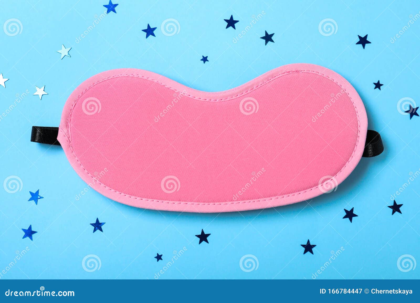 Pink Sleeping Mask and Glitter on Blue Background, Flat Lay. Bedtime ...