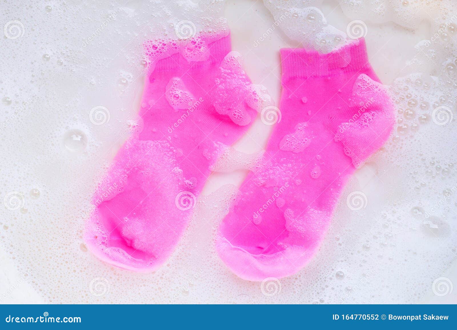 Pink Socks Soaking in Powder Detergent Water Dissolution. Laundry ...