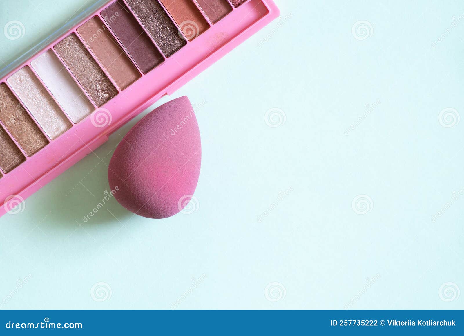 Pink Sponge and Multi-colored Shadows Lie on a Colored Background ...