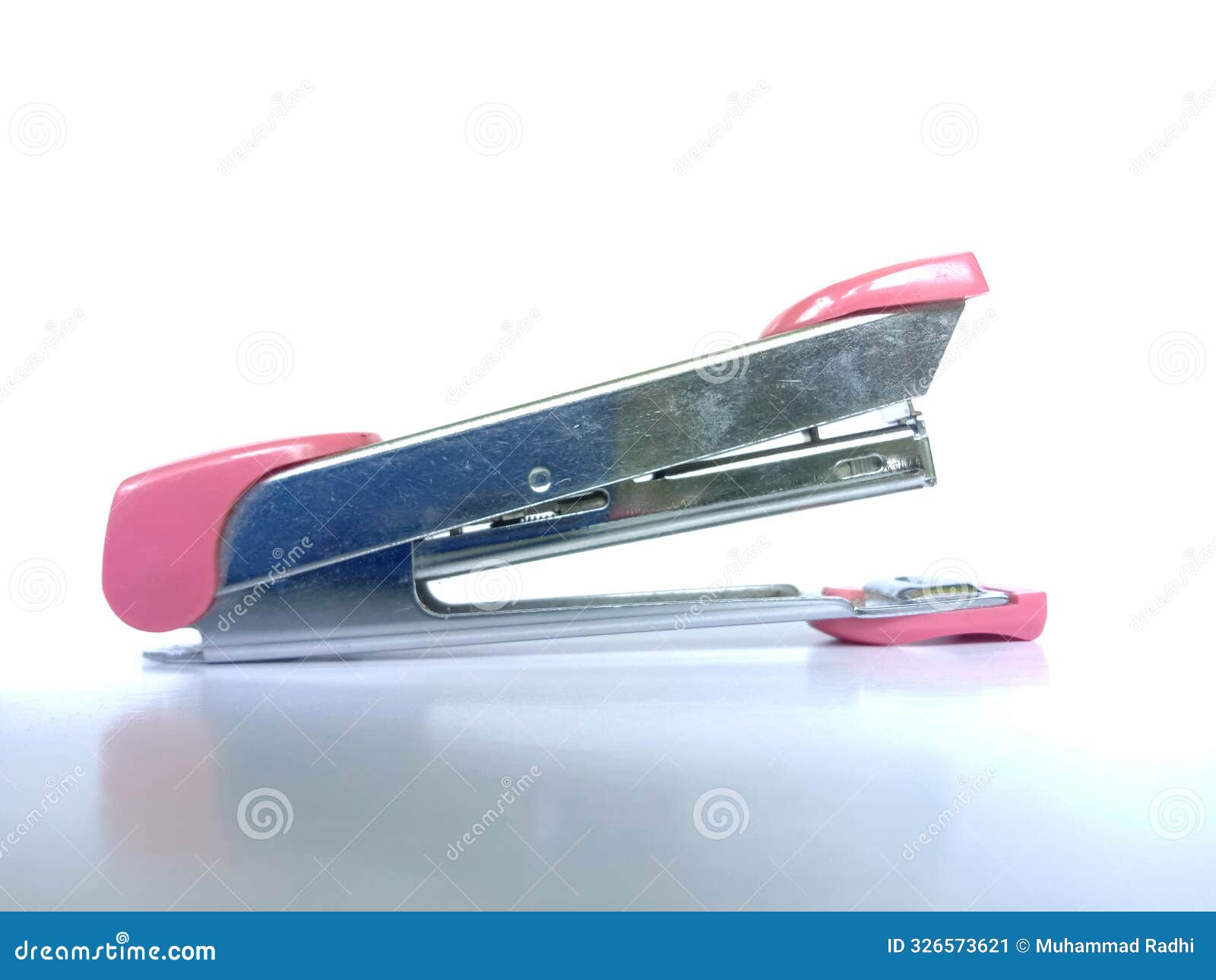 A Pink Stapler With A Pile Of Staplers Stock Image | CartoonDealer.com ...