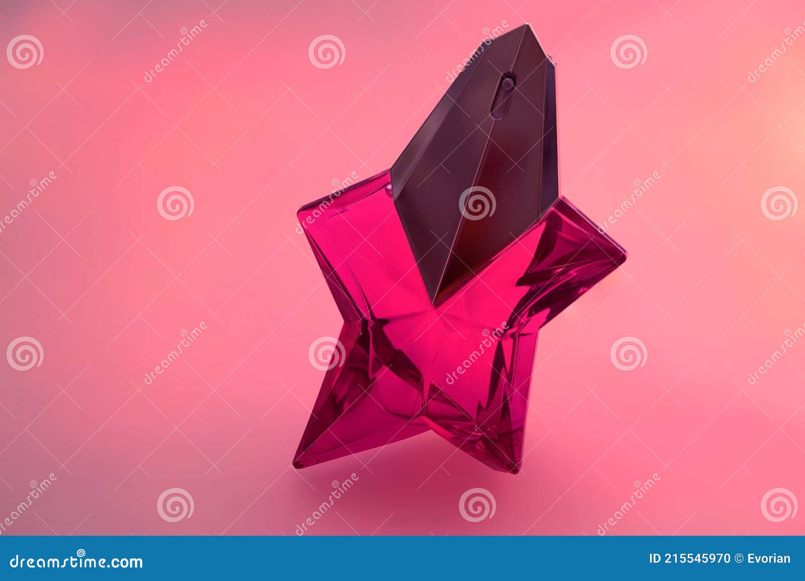 Pink Star Shaped Bottle of Perfume on Pink Background Stock Photo ...