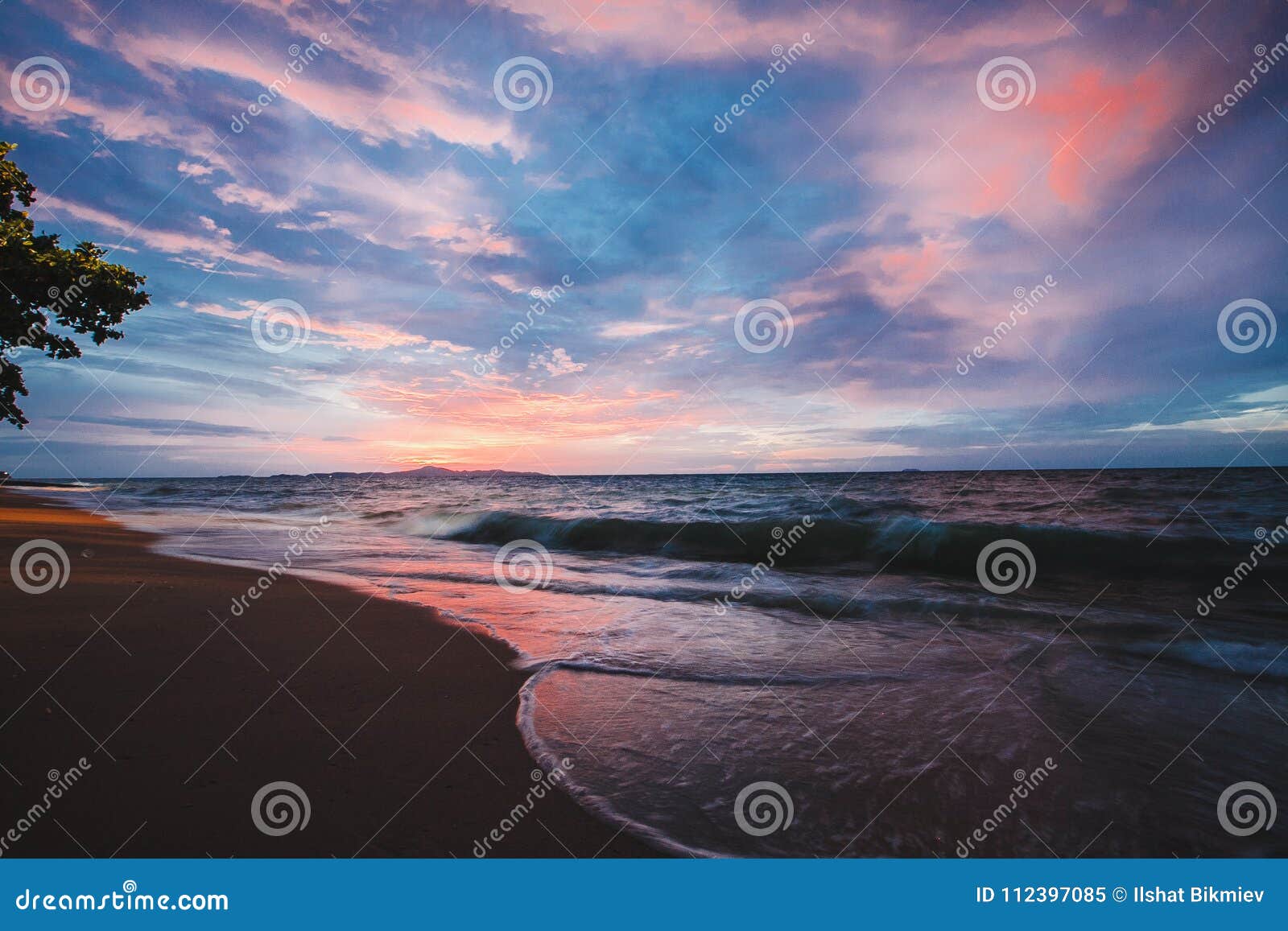 Pink Sunset on the Beach. Beach with Waves at Dusk Stock Image - Image ...