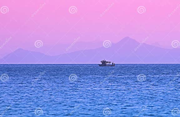 Pink sunset in Greece stock image. Image of beauty, sand - 88810939