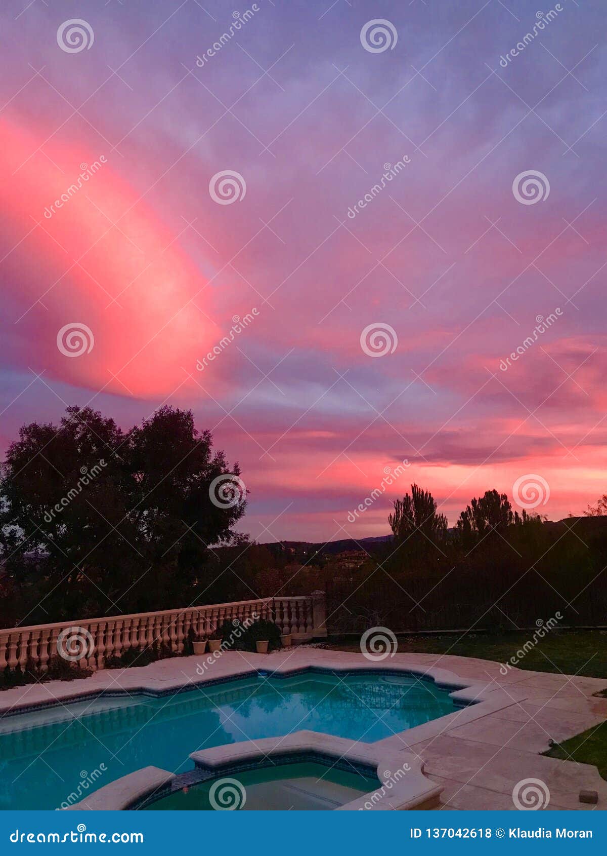 Pink Sunset with a Luxury Pool Stock Photo - Image of pink, sunset ...