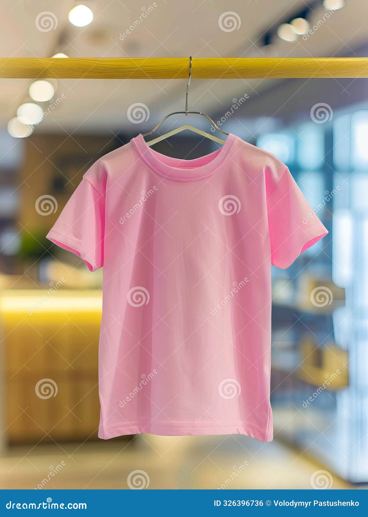 A Pink T - Shirt Hanging on a Rack Stock Photo - Image of rack, corn ...