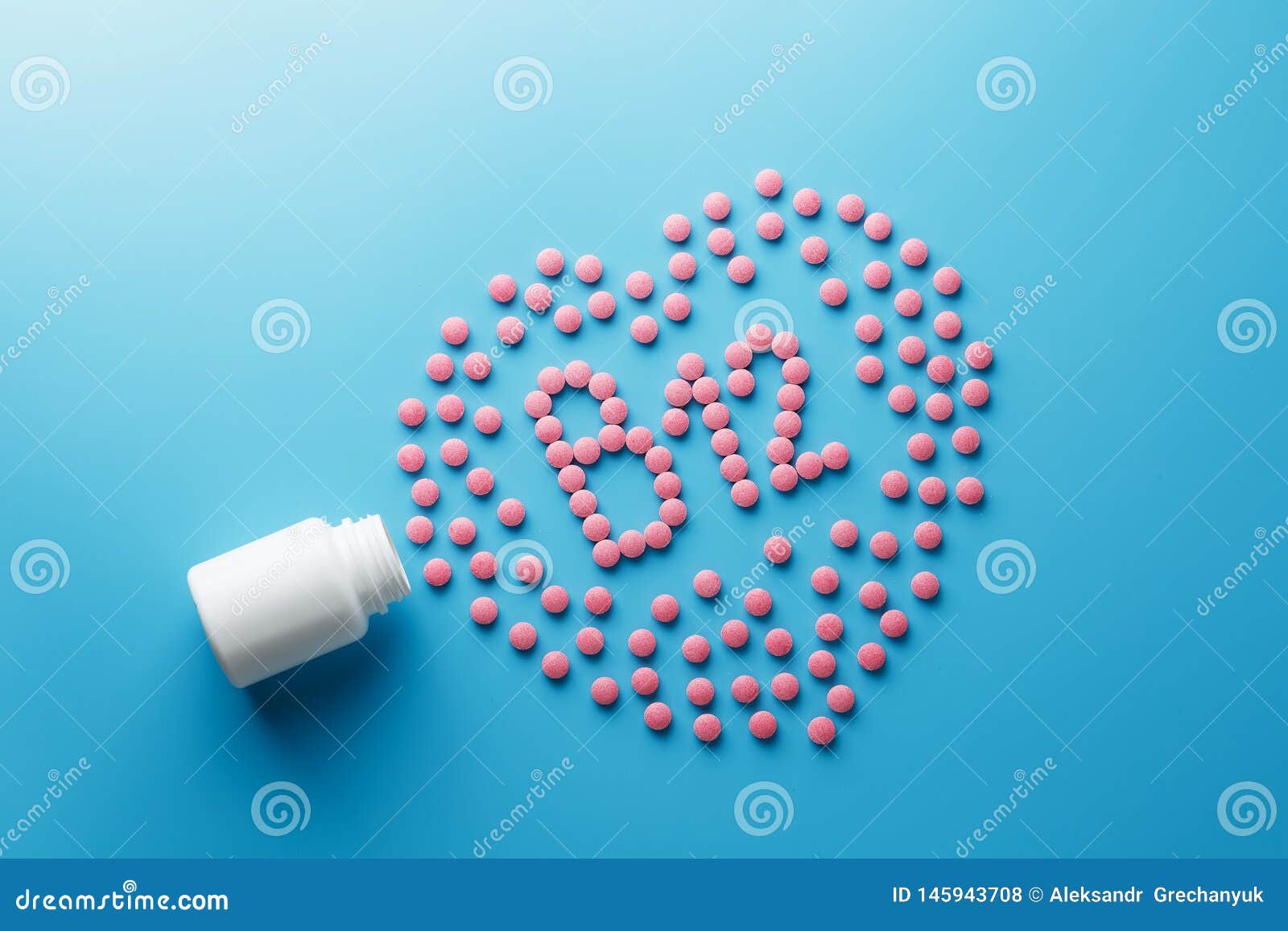 Pink Tablets in the Form of B12 in the Heart on a Blue Background ...