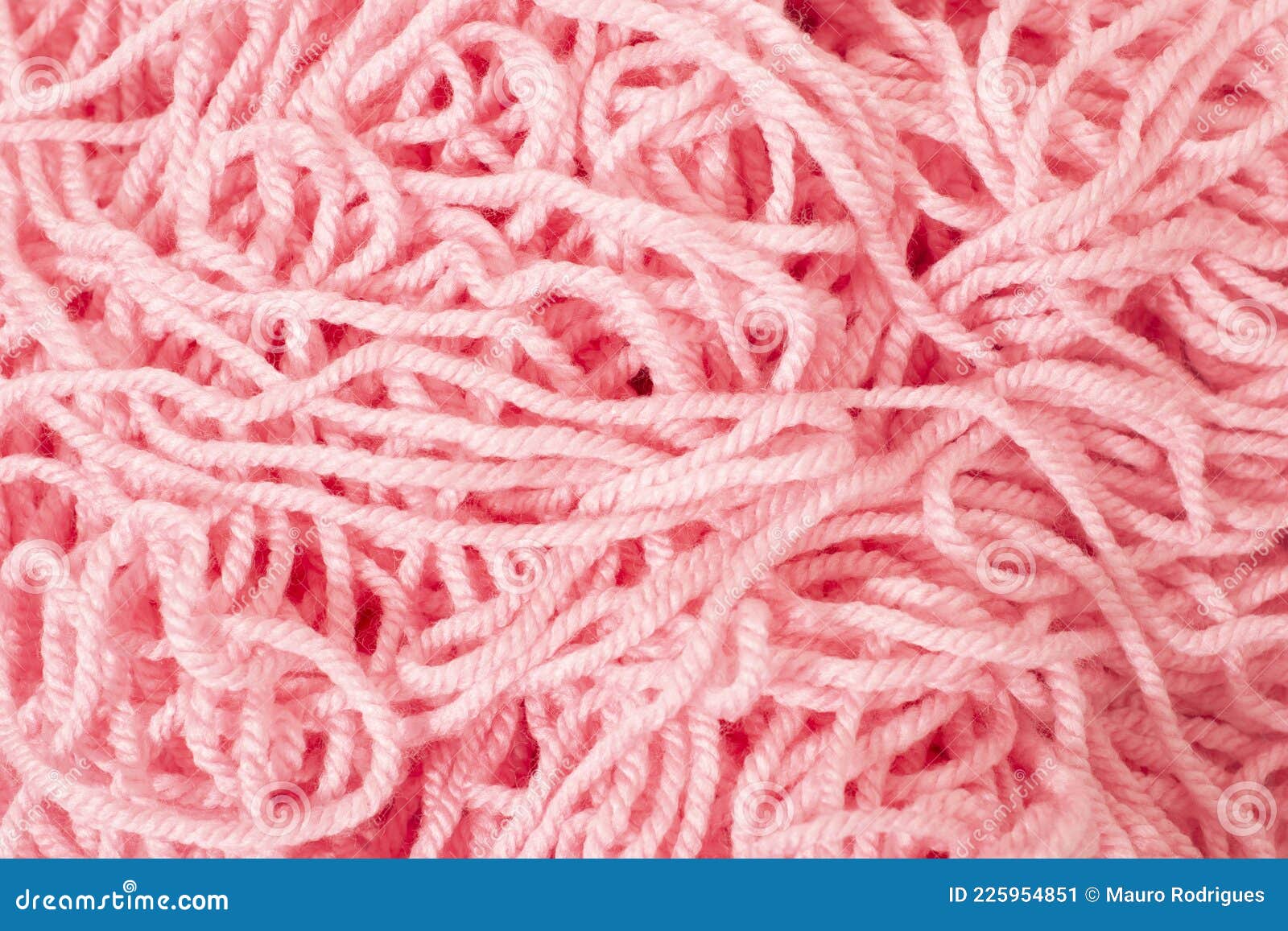 Pink tangled knitting yarn stock image. Image of roll - 225954851