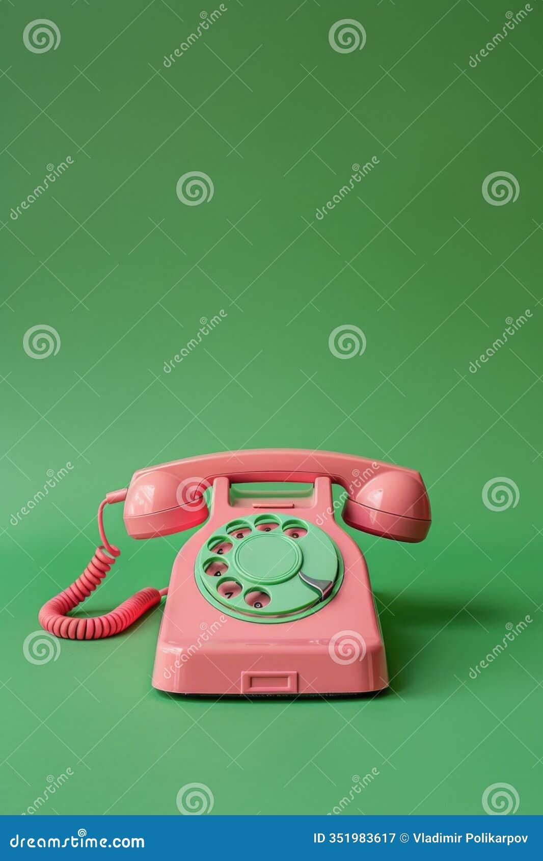 Pink Telephone on a Green Surface, Suitable for Communication Concept ...