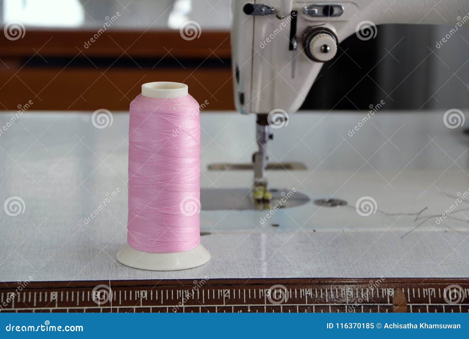 Pink Thread in the Thread Roll Put Vertical on the Sewing Machine ...