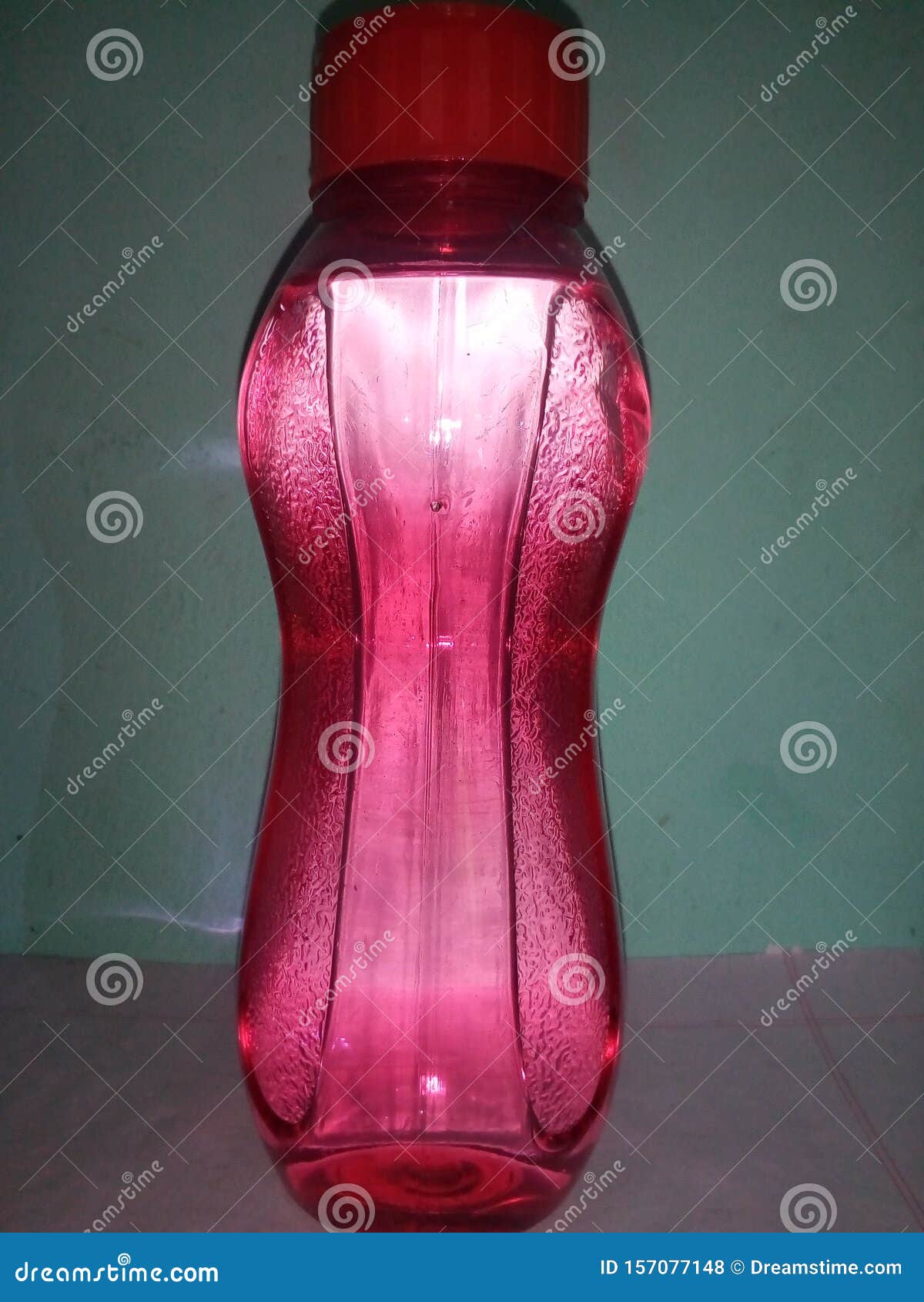 Pink Water bottol stock photo. Image of luxury, bottol - 157077148