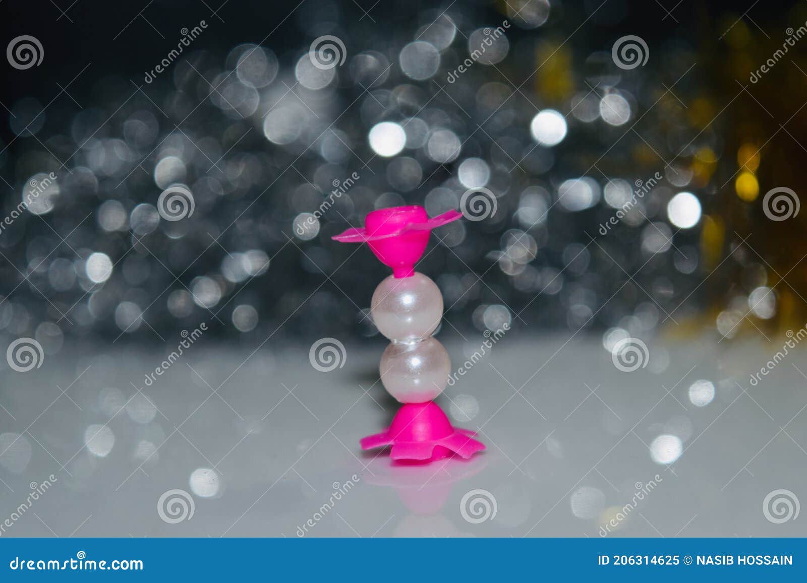 Pink and White Plastic Objects with Glowing Lights Stock Image - Image ...