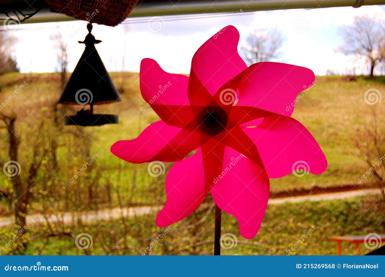 Pink Windmill on the Balcony Stock Photo - Image of balcony, spring ...