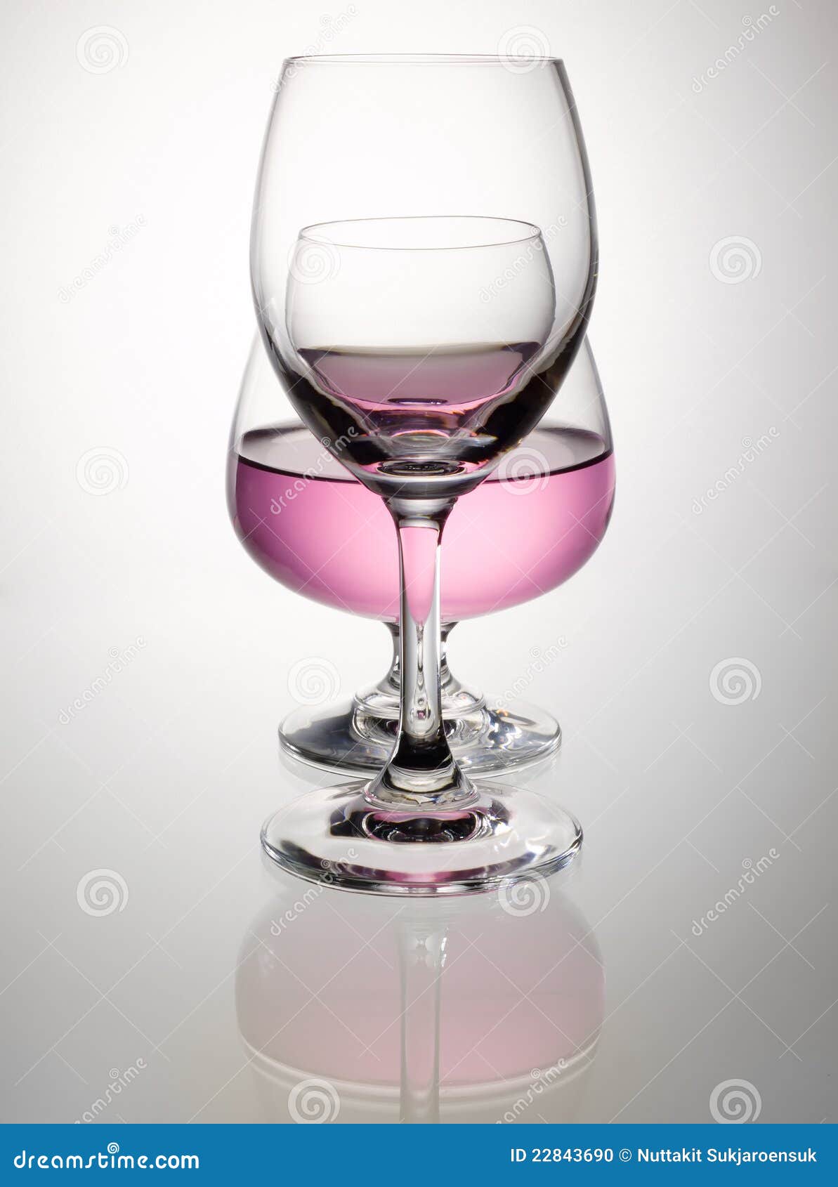 Pink Wine in Brandy Glass Overlap and Reflection Stock Photo - Image of ...