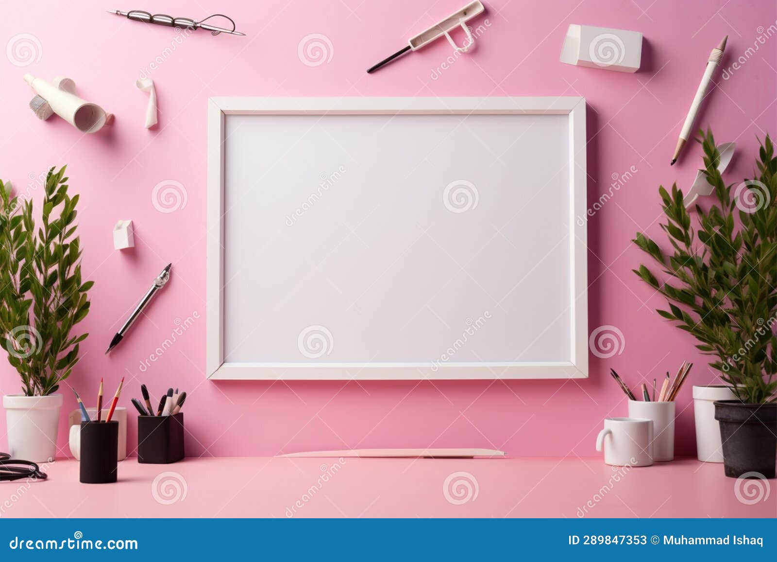 Pink Workspace Setting with a White Frame and Office Supplies Stock ...