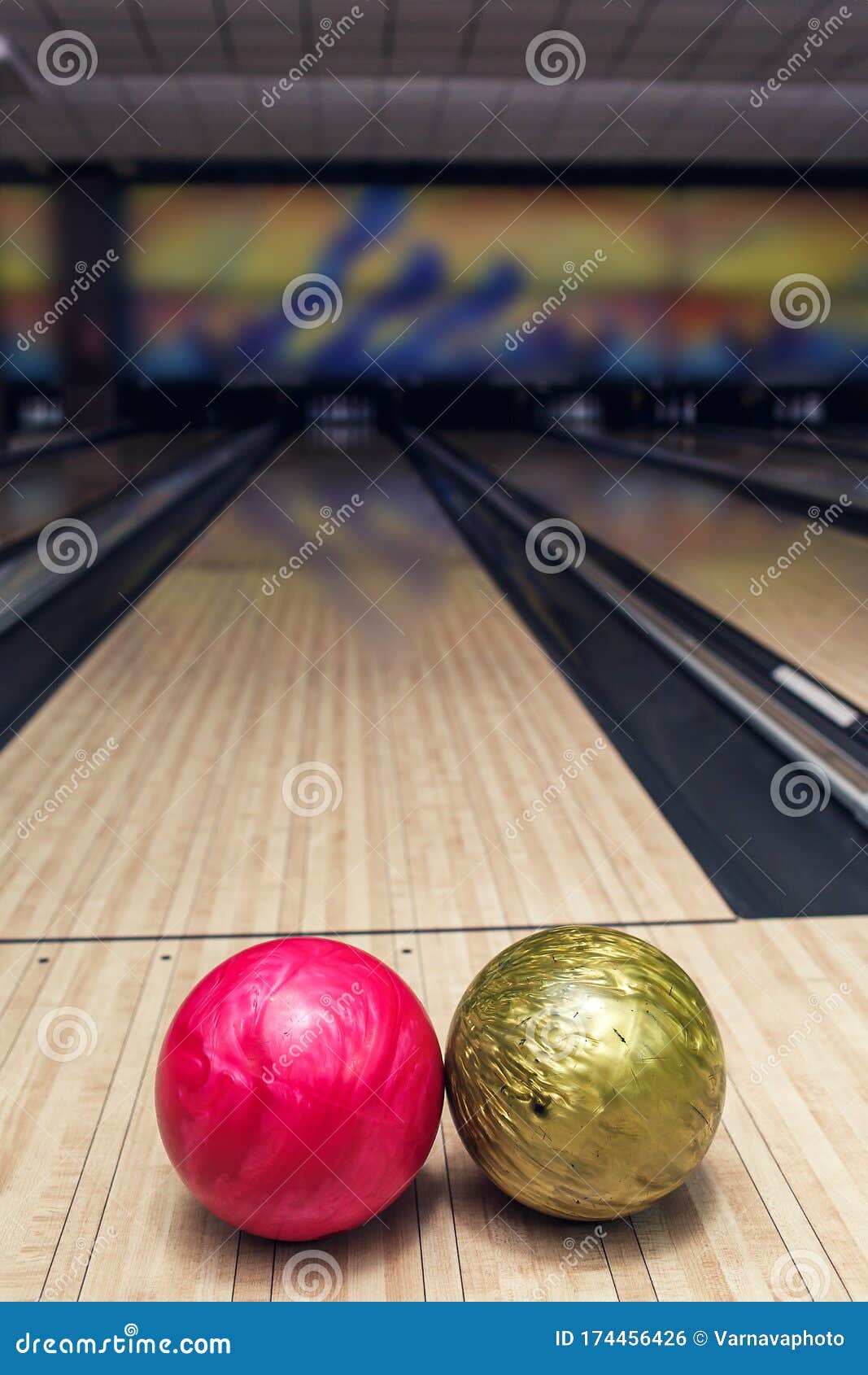 Pink and Yellow Ball on Bowling Lane before Hit Stock Photo - Image of ...