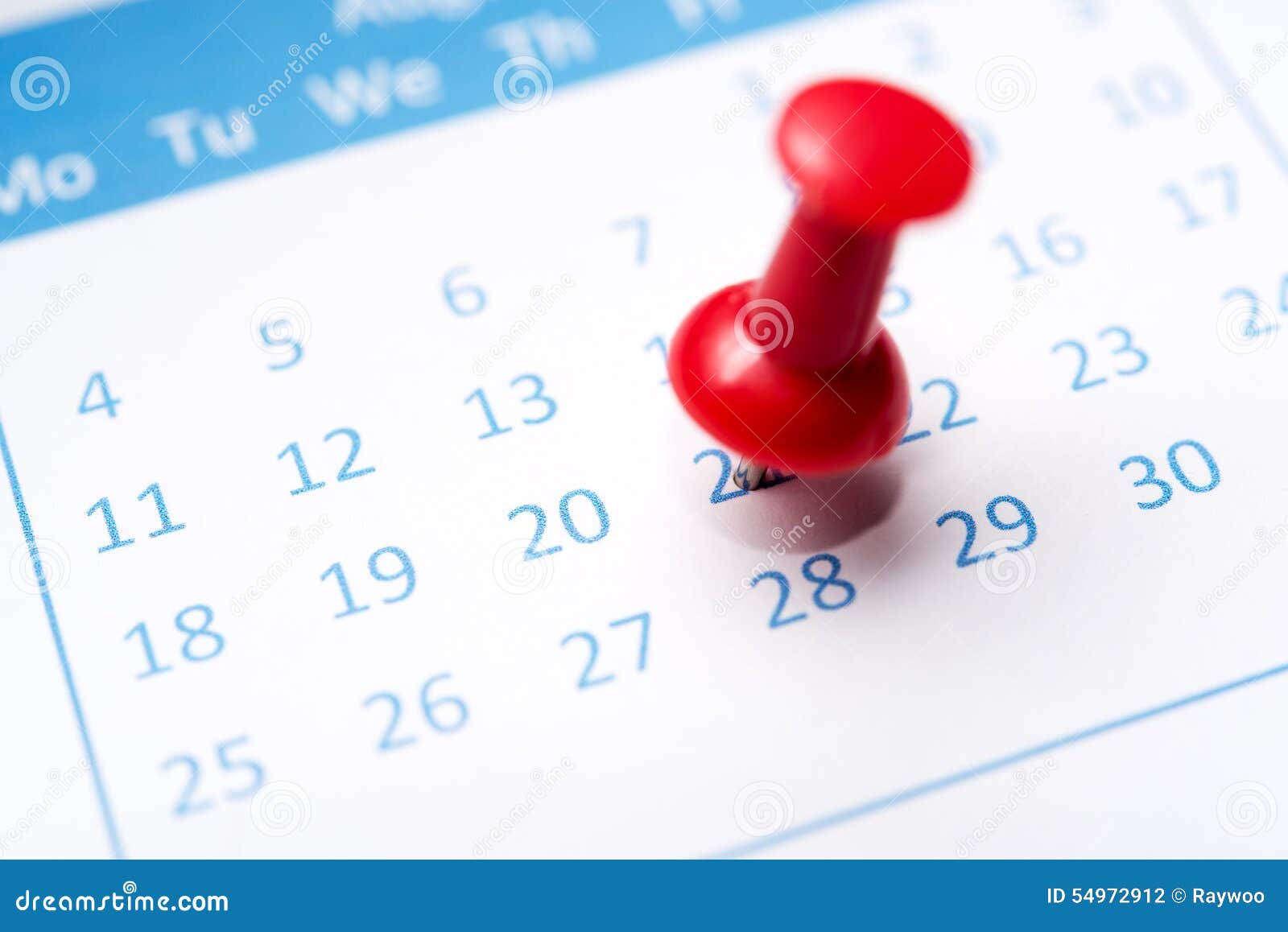 Pinned on calendar stock photo. Image of stationery, planning - 54972912