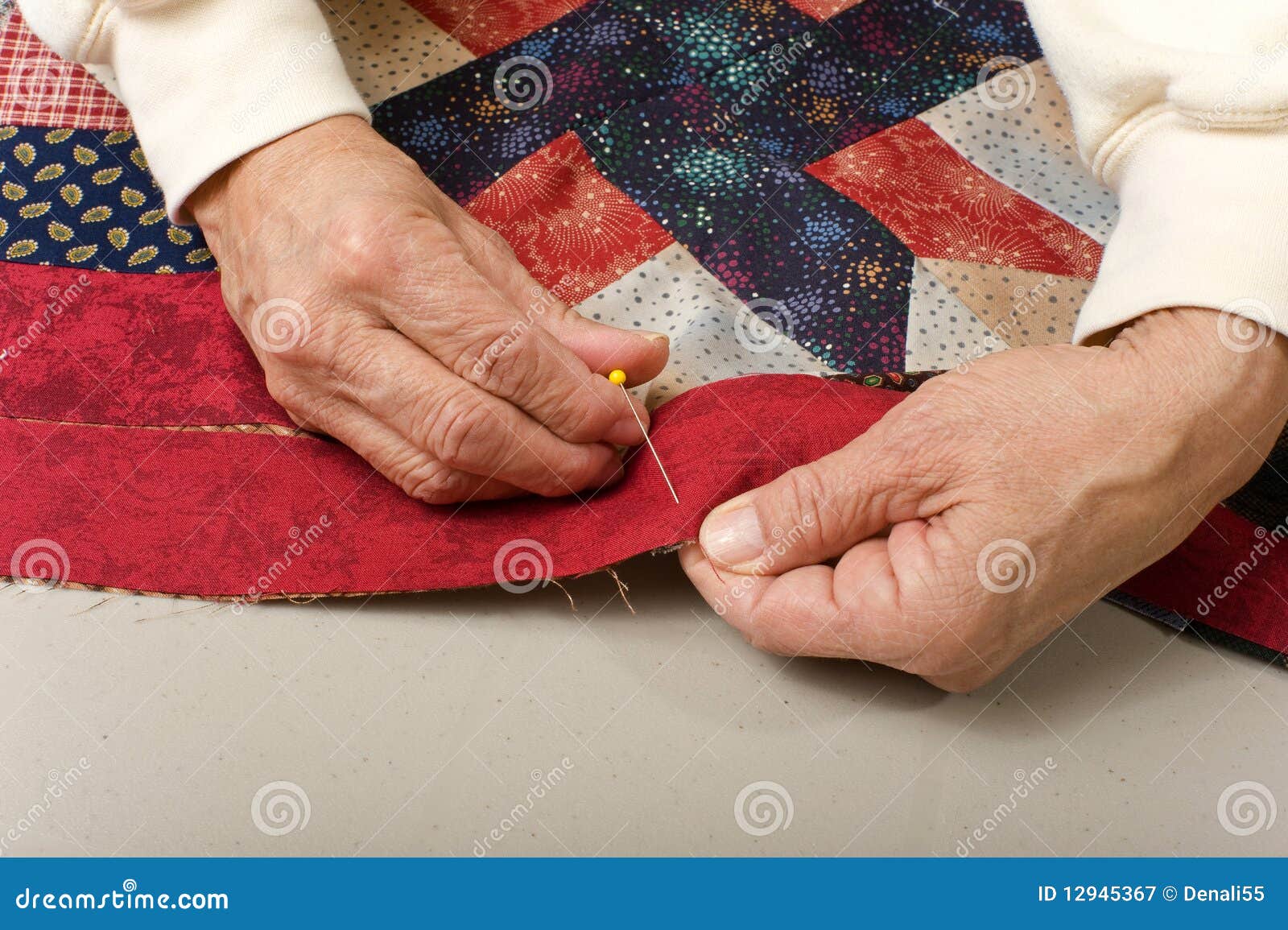 Pinning on a Border on a Quilt Stock Image - Image of fabric, quilter ...