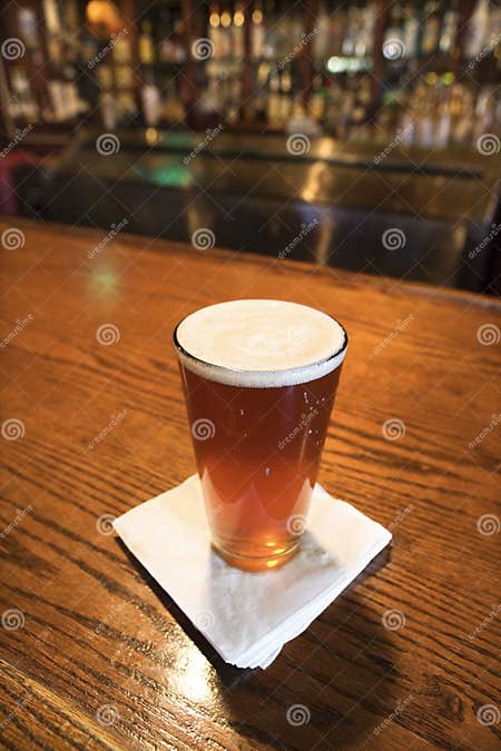 Pint of beer on bar. stock photo. Image of color, nightlife - 2044070