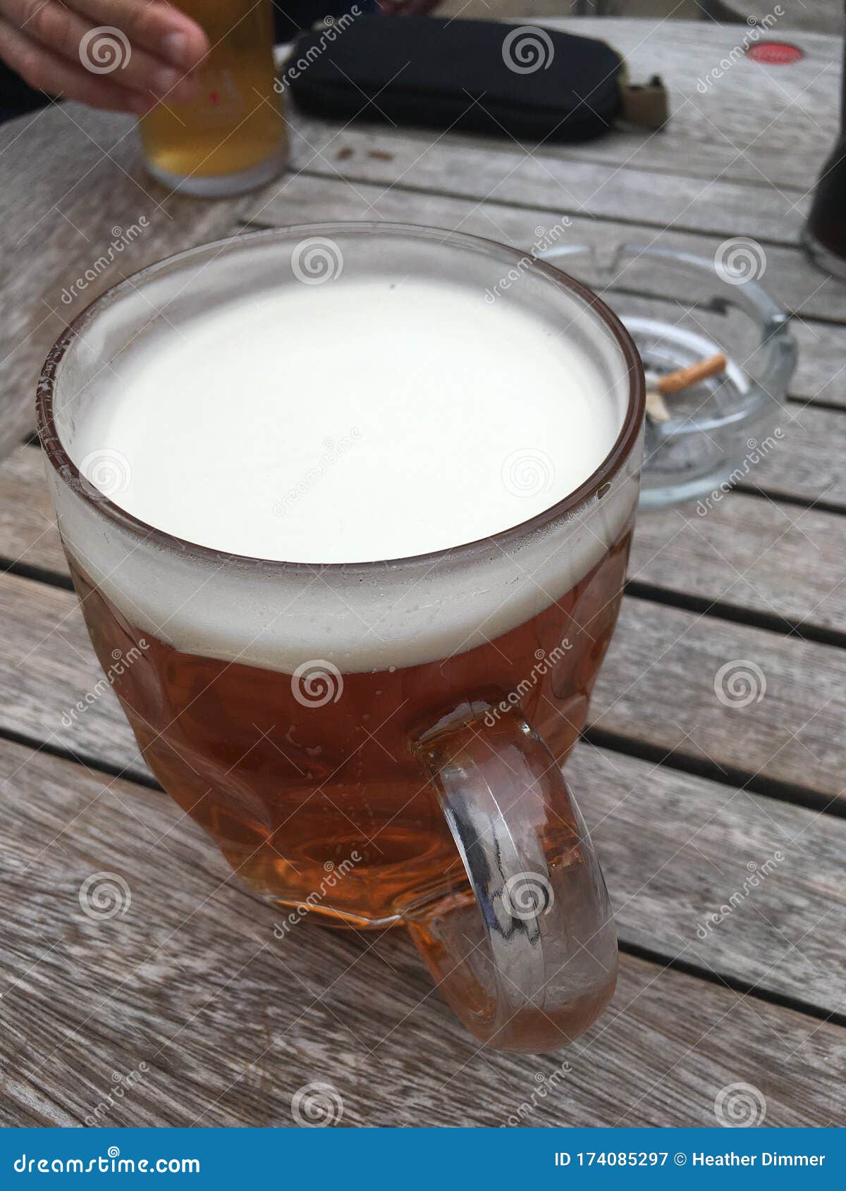 Pint of Beer on Bench Table Stock Image - Image of poured, drink: 174085297