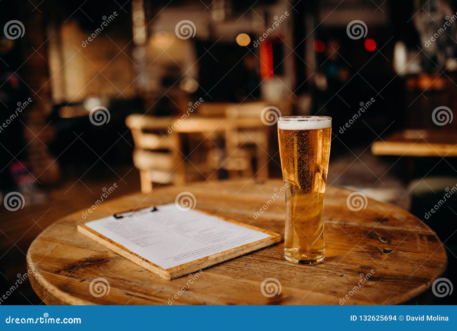 Pint of beer on a table. stock photo. Image of amber - 132625694